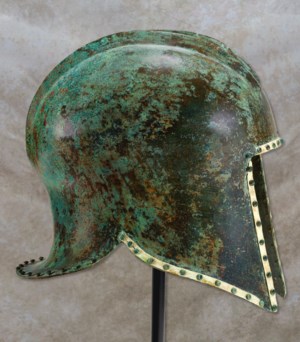 A GREEK BRONZE AND BONE ILLYRIAN HELMET, ARCHAIC PERIOD, CIRCA EARLY TO ...