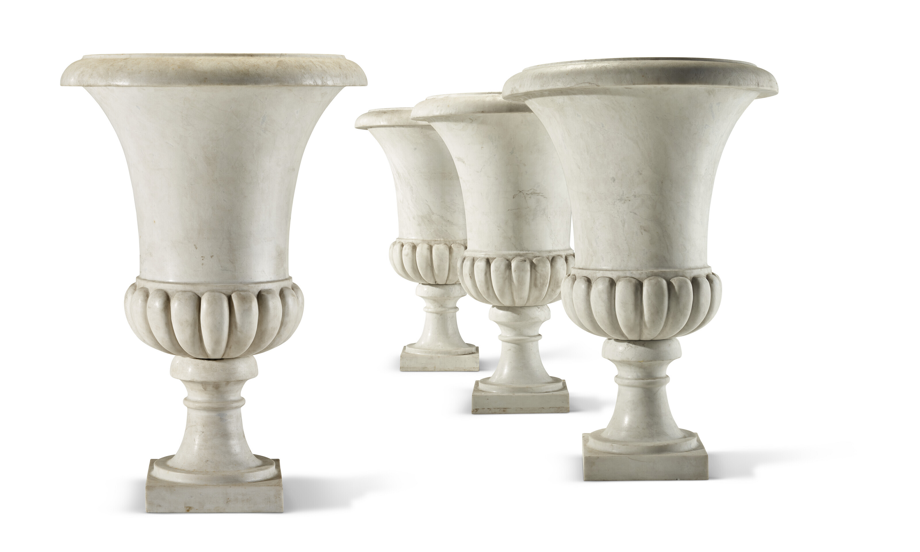 A SET OF FOUR LARGE WHITE MARBLE GARDEN URNS, 20TH CENTURY | Christie’s