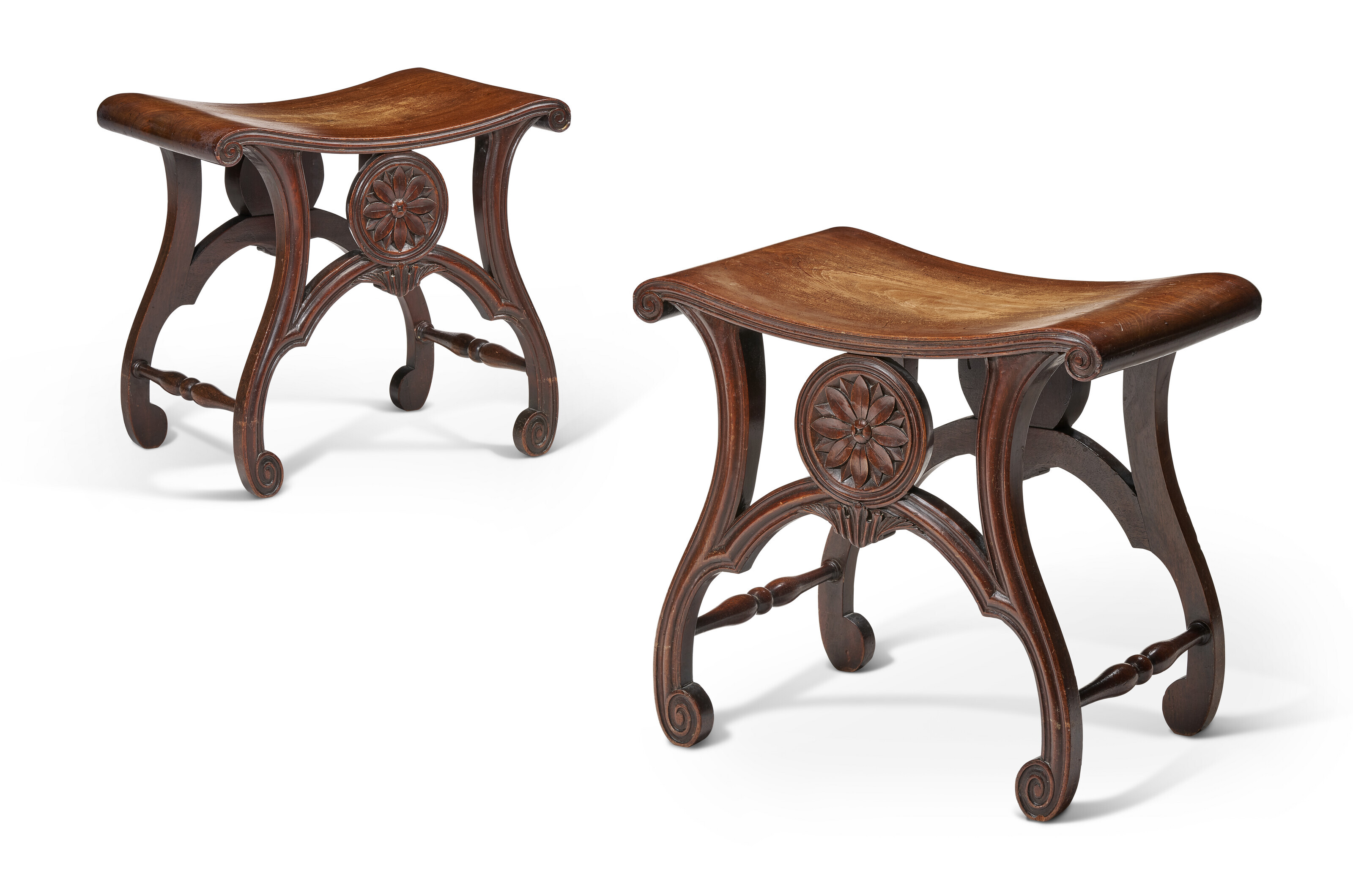 A PAIR OF GEORGE III MAHOGANY HALL STOOLS, ATTRIBUTED TO THOMAS ...