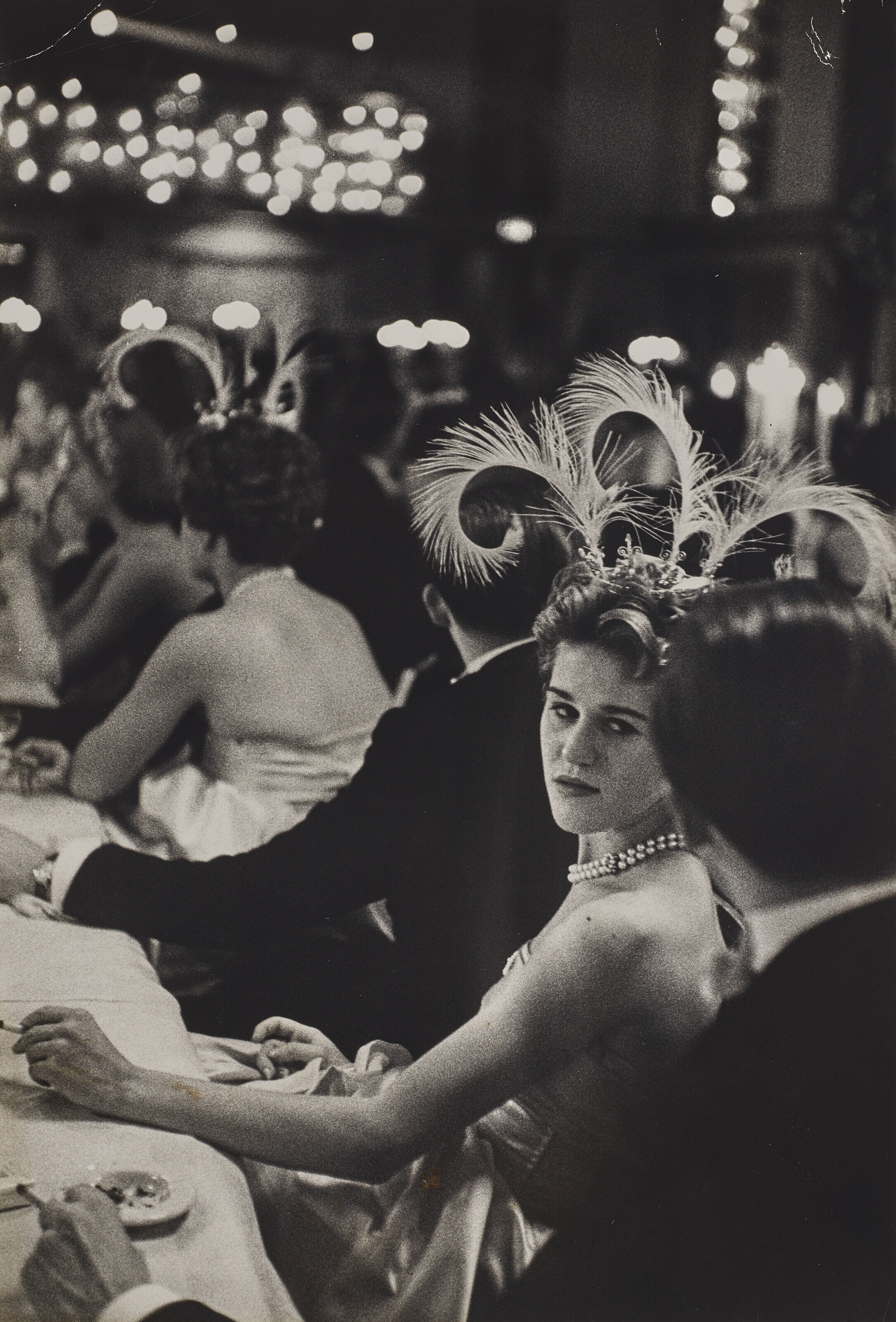 HENRI CARTIER–BRESSON (1908–2004), Untitled (woman with feathers in ...