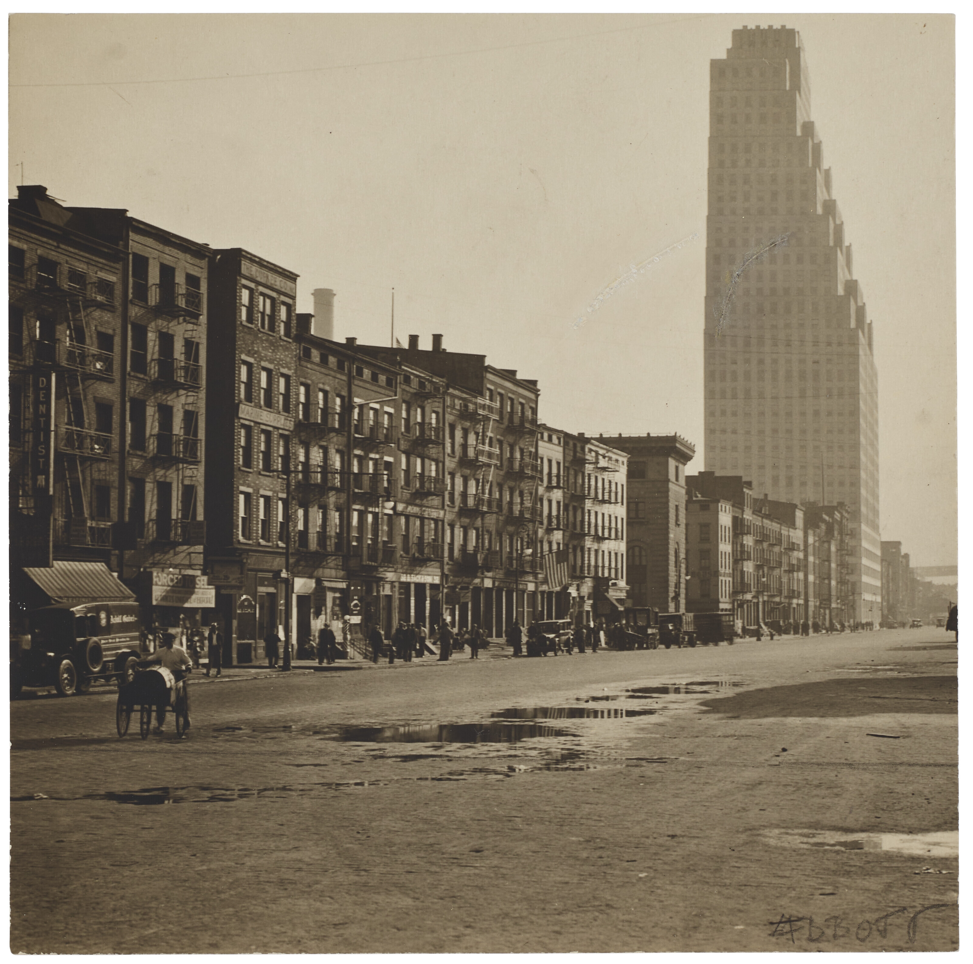BERENICE ABBOTT (1898–1991), New York (View North East on South Street, 120 Wall Street building ...