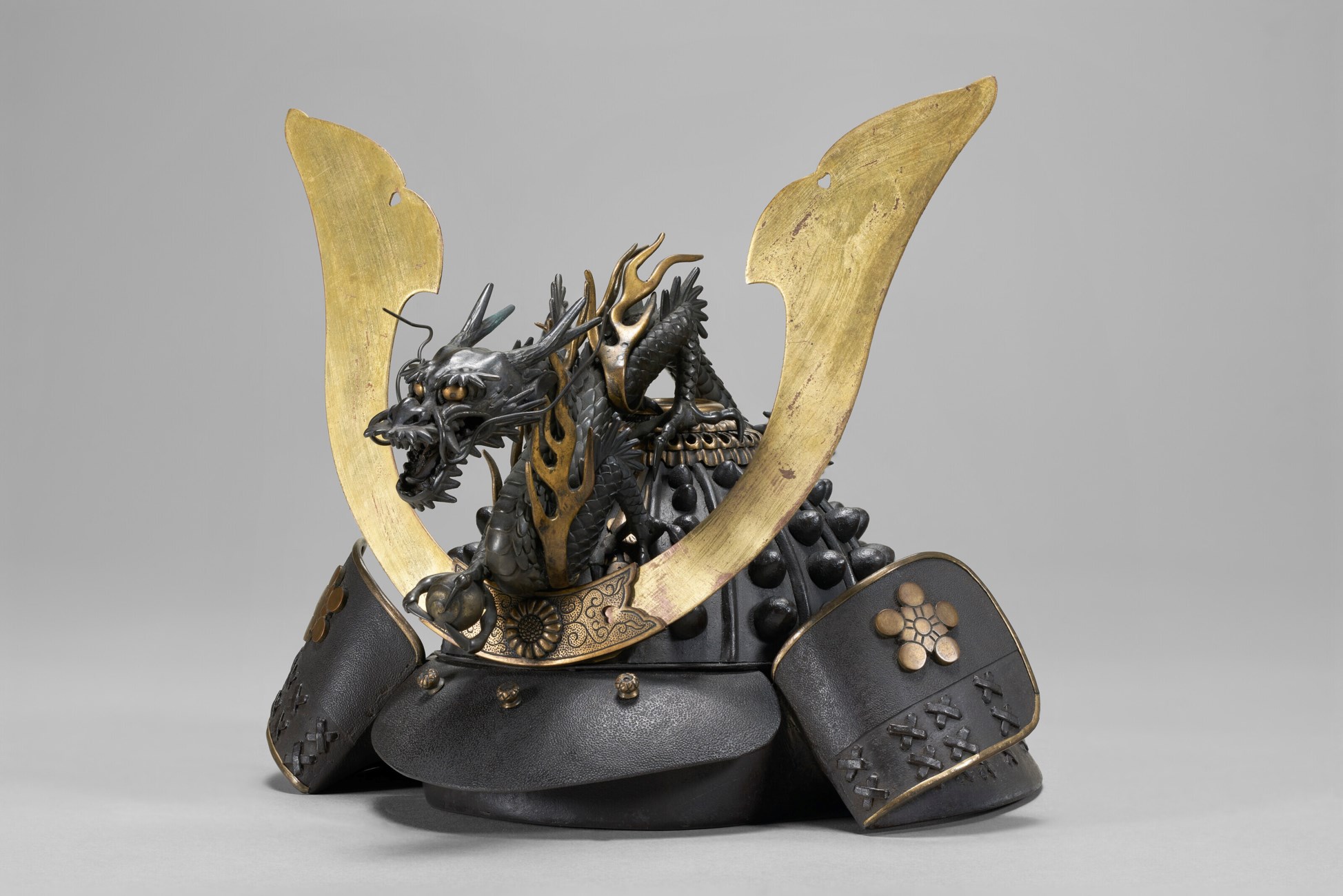 AN IRON INCENSE BURNER OF A MELMET WITH JIZAI DRAGON MAEDATE, MEIJI ...