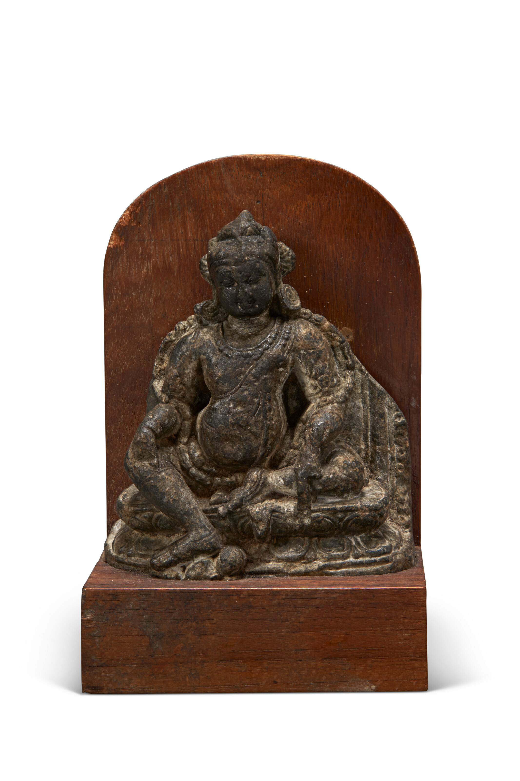 A BLACK STONE FIGURE OF JAMBHALA, NORTHEASTERN INDIA, PALA PERIOD, 11TH ...