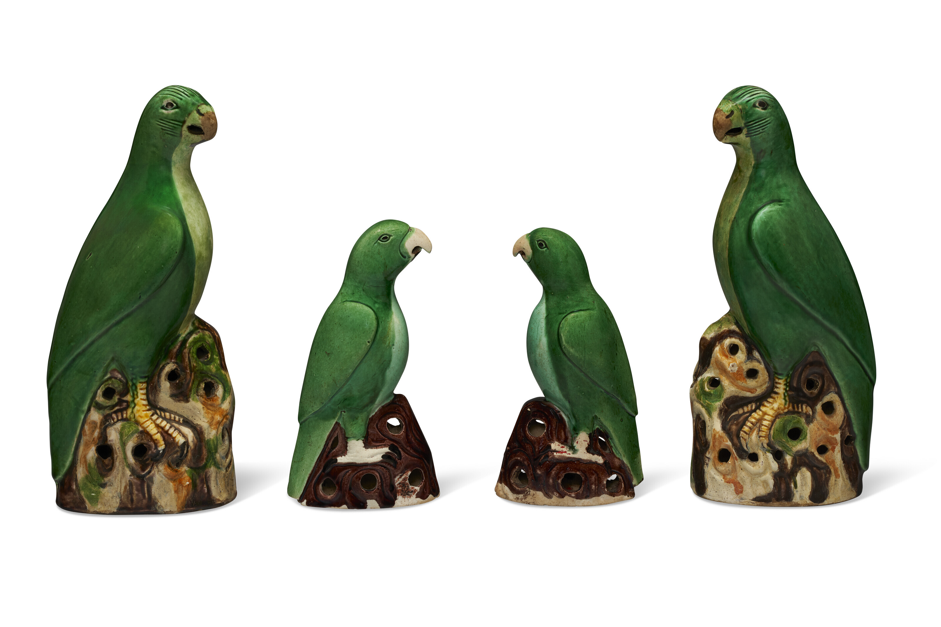 TWO PAIRS OF GREEN-ENAMELED FIGURES OF PARROTS, CHINA, KANGXI PERIOD ...