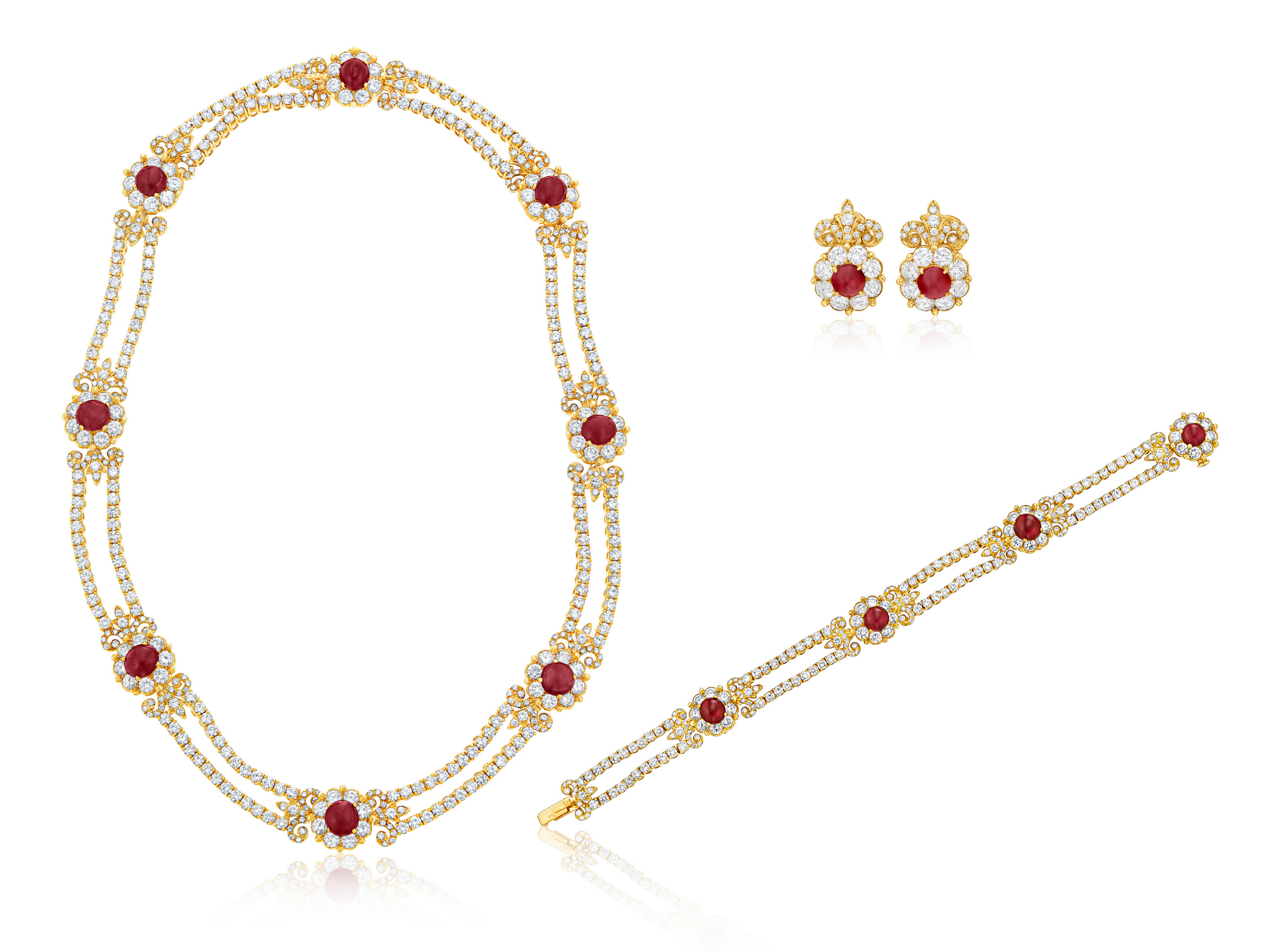 REZA SUITE OF RUBY AND DIAMOND JEWELRY, | Christie’s
