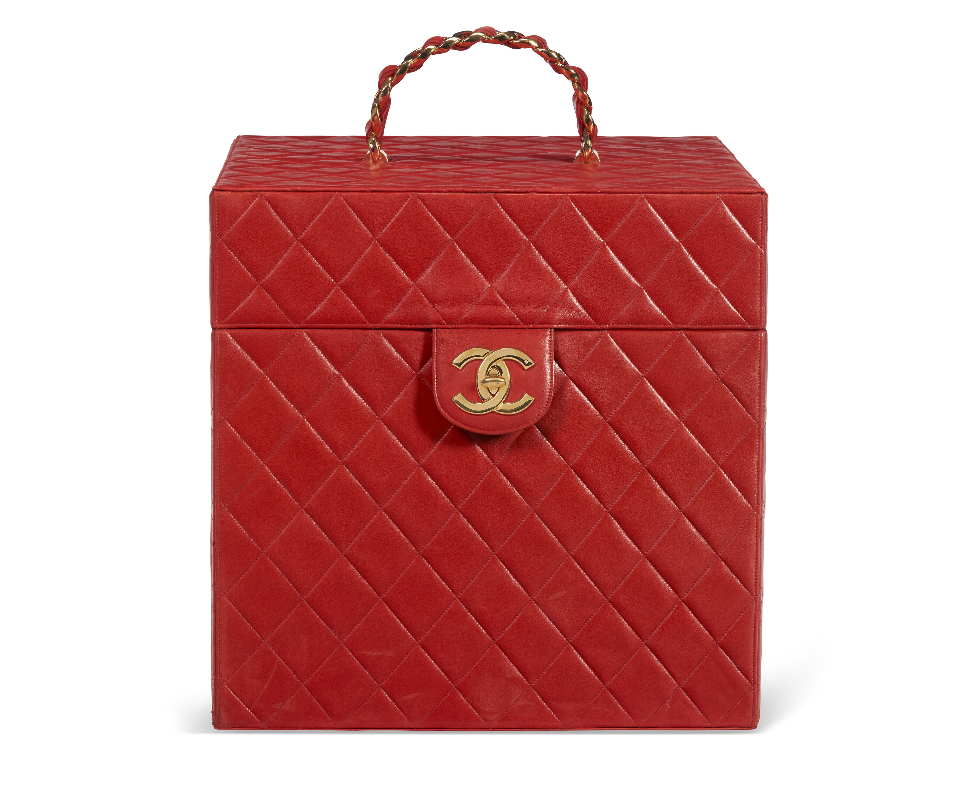 A RARE, RED QUILTED LAMBSKIN LEATHER OVERSIZED VANITY CASE WITH GOLD ...
