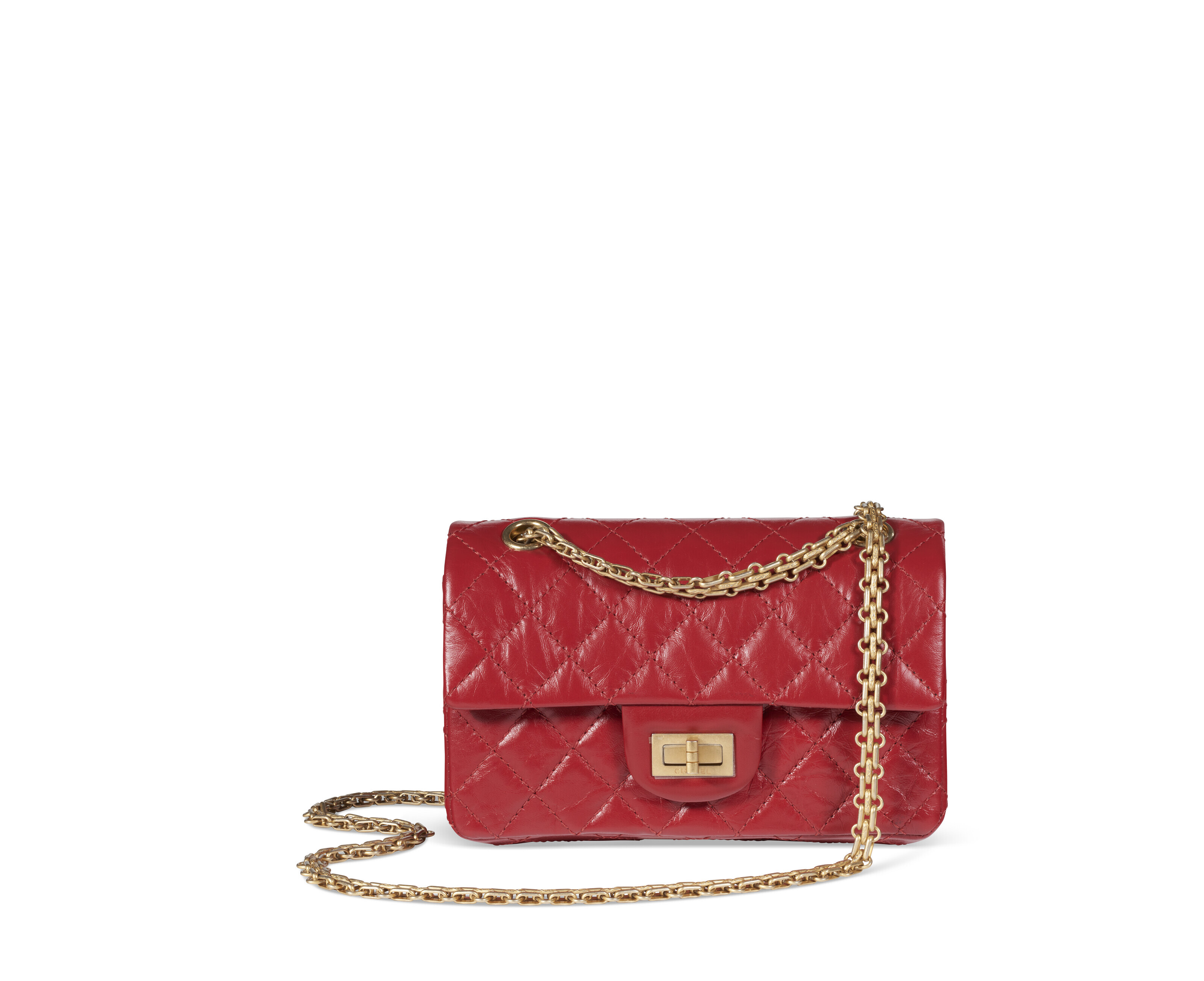 A RED QUILTED AGED CALFSKIN LEATHER MINI REISSUE 2.55 FLAP BAG WITH ...