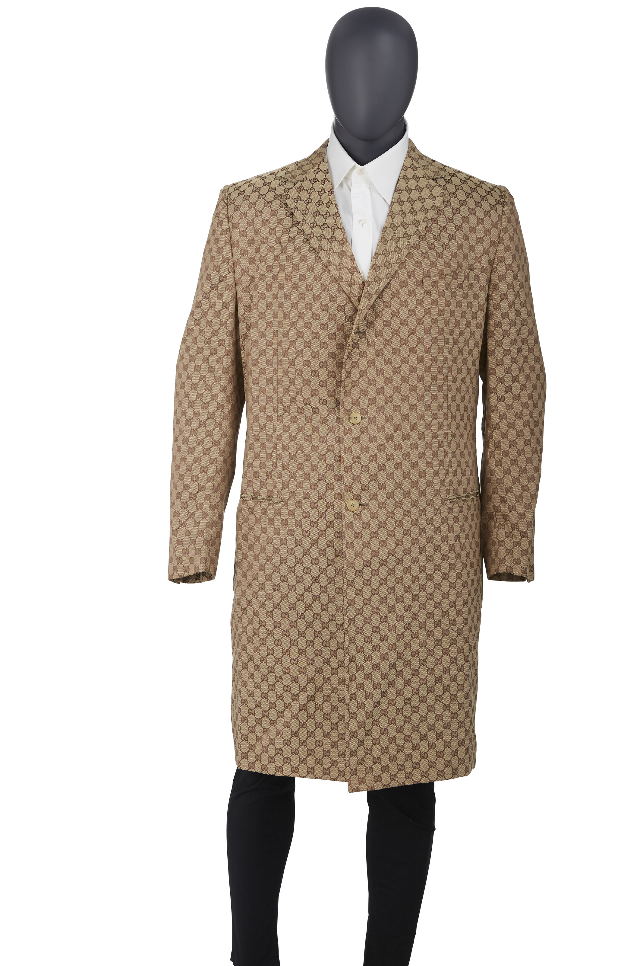 A TAN AND LIGHT BROWN GUCCI LOGO SINGLE-BREASTED COAT, GUCCI, LATE 20TH ...