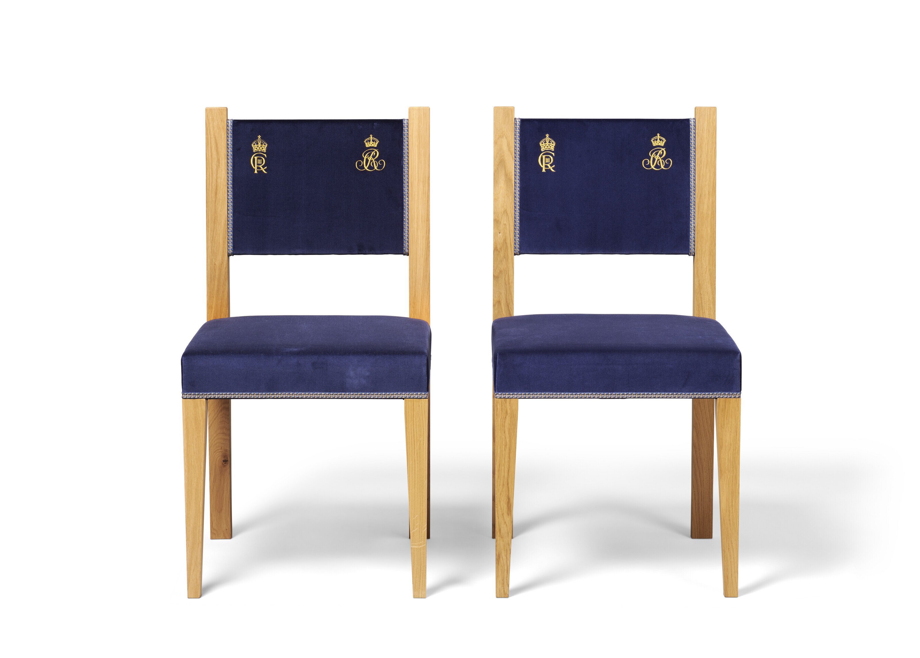 A PAIR OF CHARLES III OAK CORONATION CHAIRS, BY N.E.J STEVENSON & SONS ...