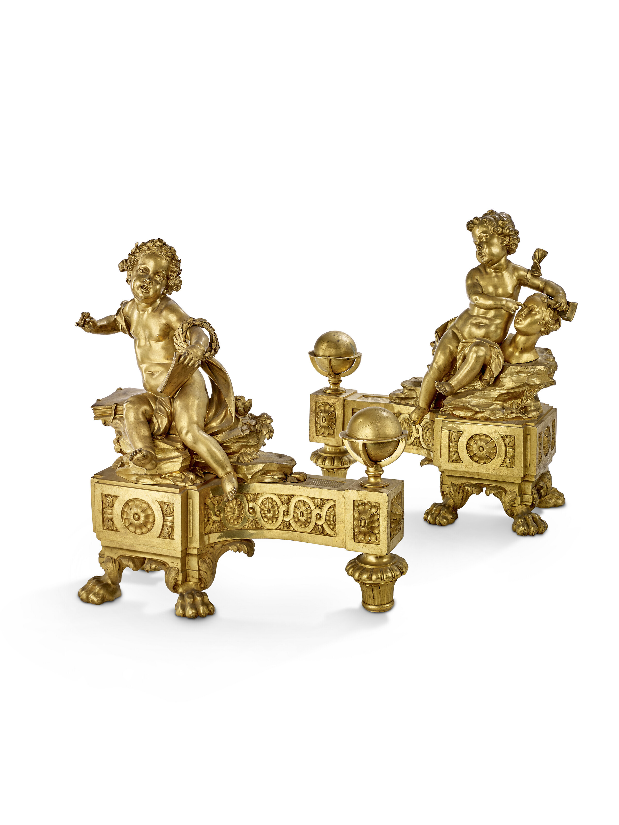 A PAIR OF FRENCH ORMOLU CHENETS, AFTER THE MODEL BY PHILIPPE CAFFIERI ...