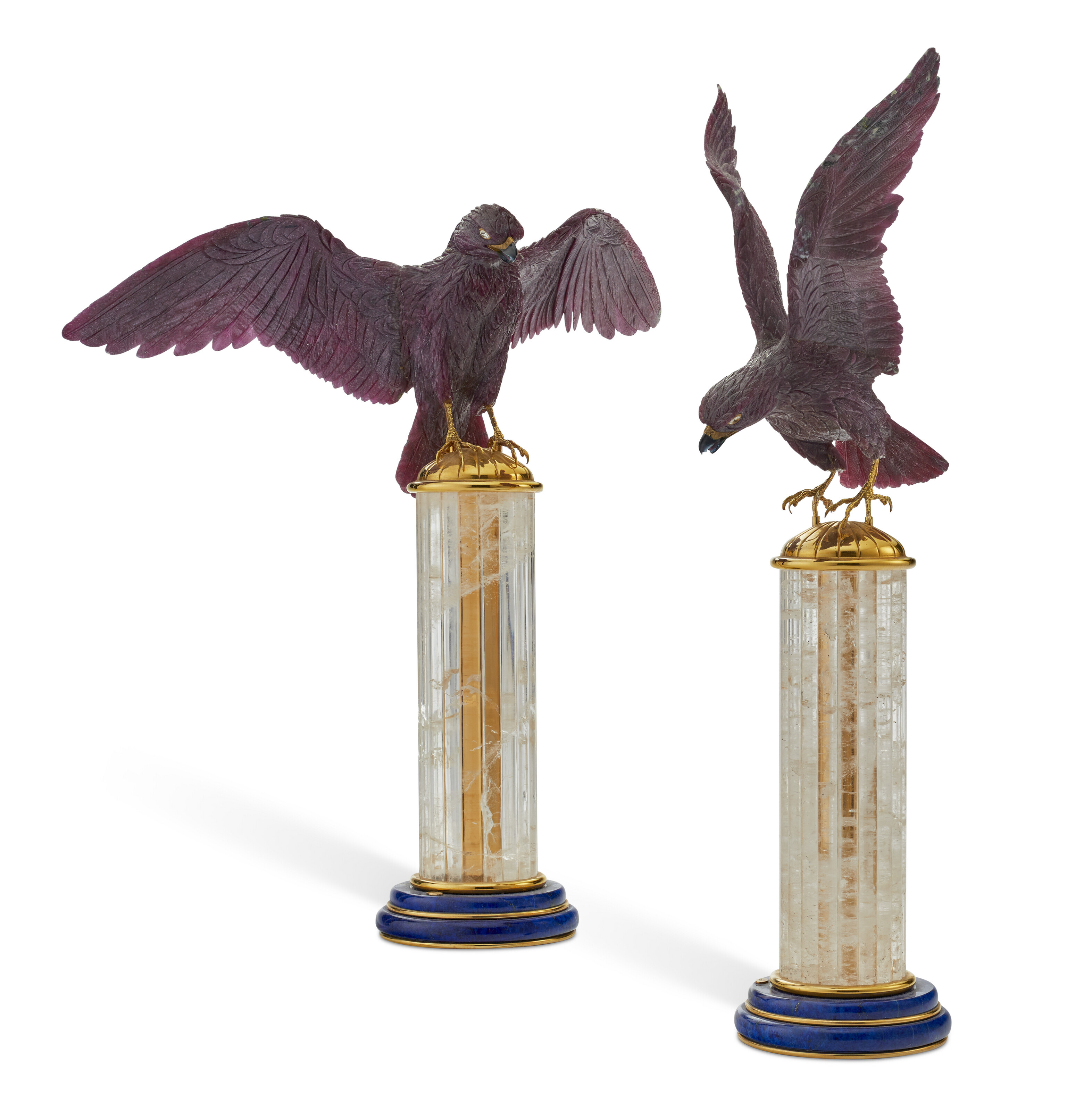 A PAIR OF CARVED RUBY, SAPPHIRE, DIAMOND, AND GOLD MODELS OF FALCONS ...