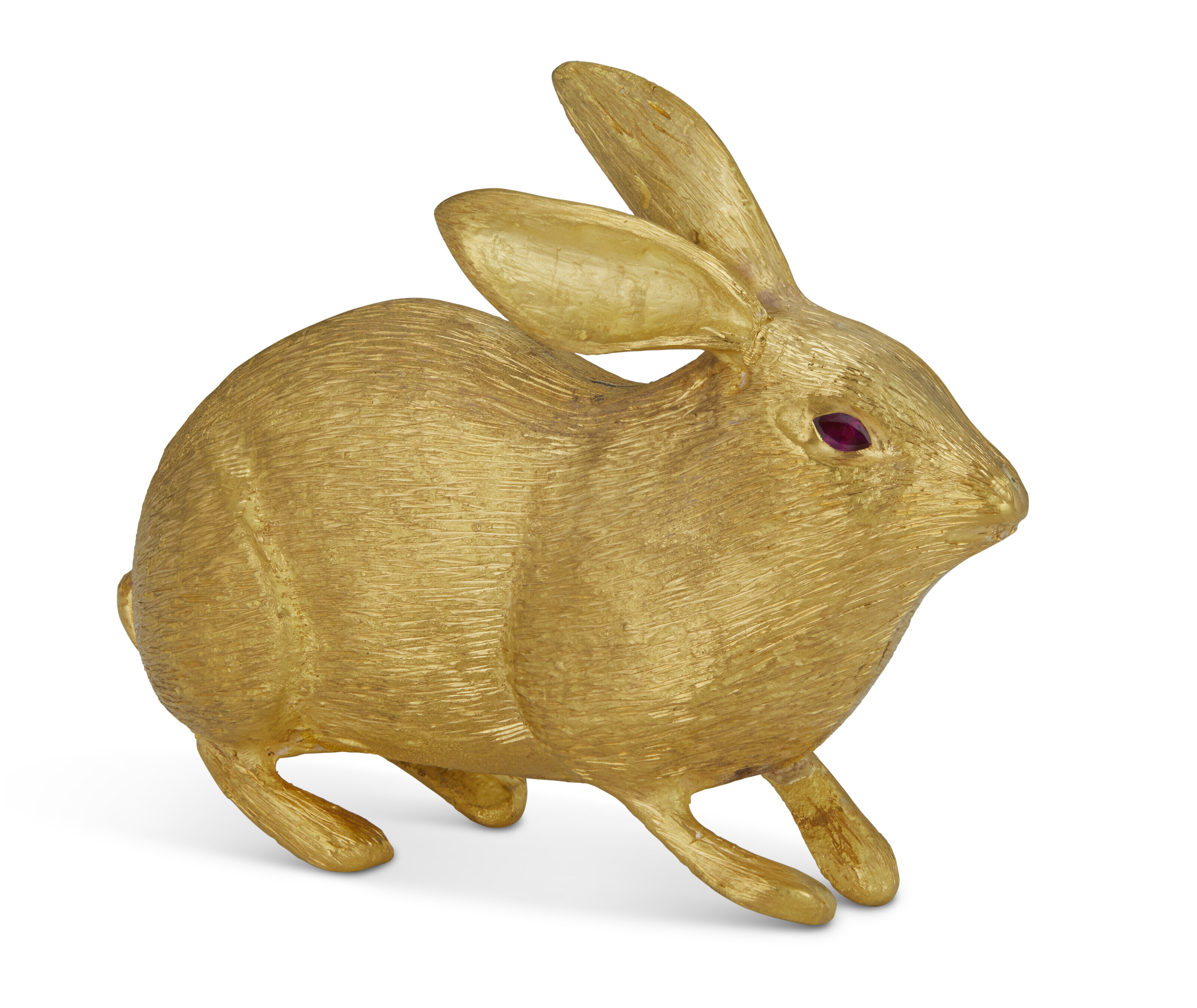A RUBY-MOUNTED 24K GOLD FIGURE OF A RABBIT, SECOND HALF 20TH CENTURY ...