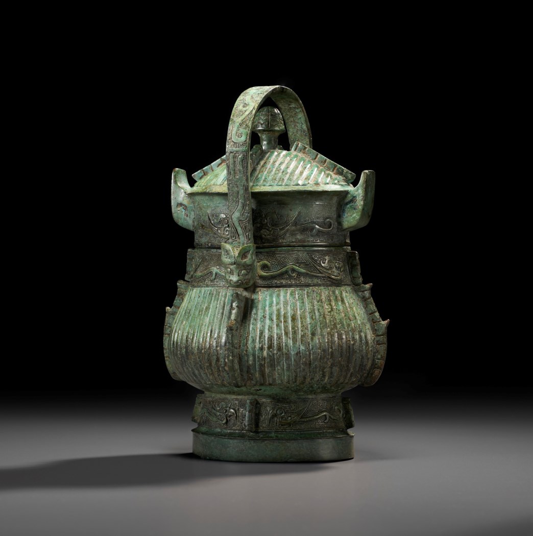 A RARE SMALL BRONZE RITUAL WINE VESSEL AND COVER, YOU, EARLY WESTERN ...