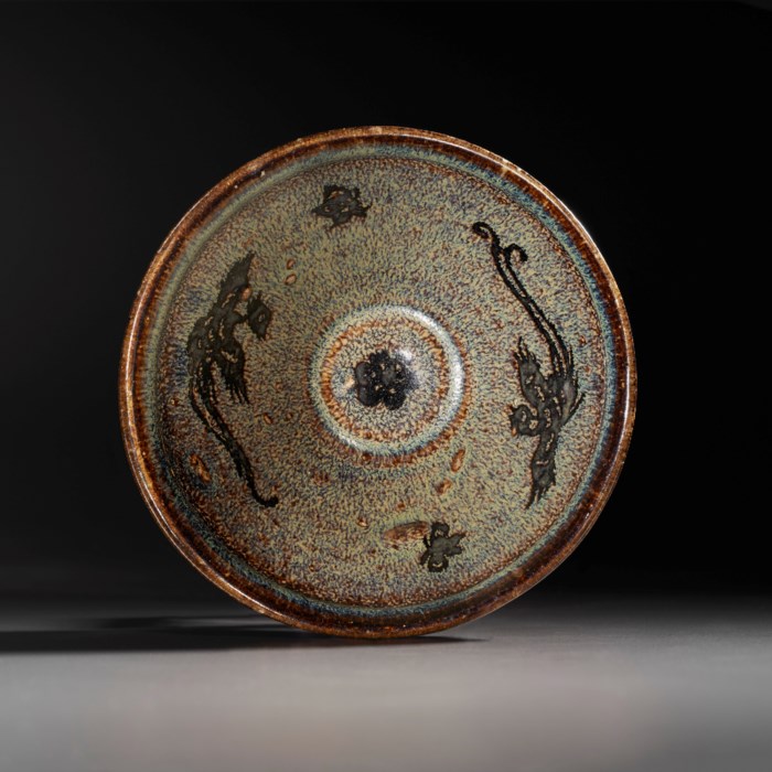 A SUPERB JIZHOU PAPER-CUT-DECORATED 'PHOENIX' TEA BOWL, SOUTHERN SONG ...