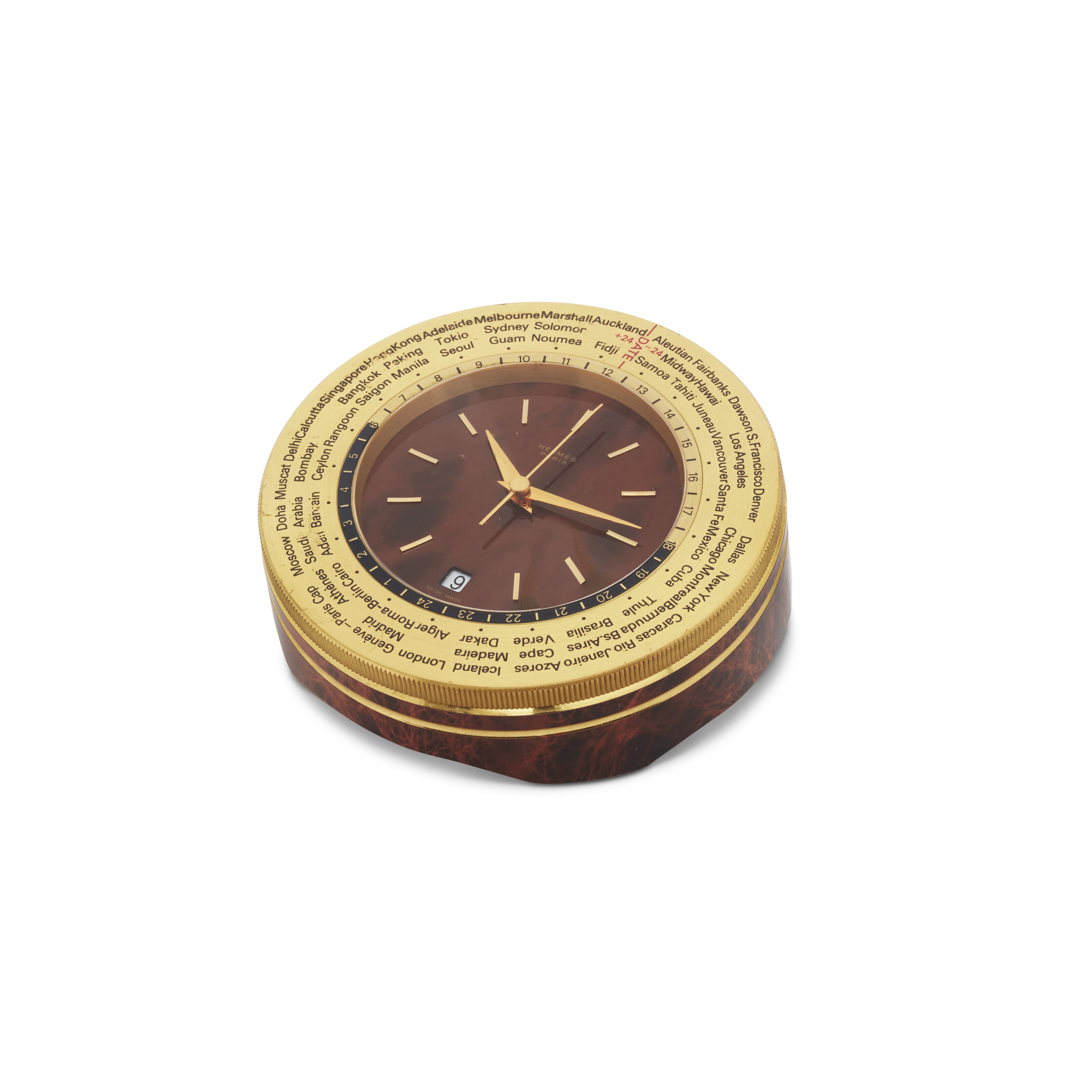 A GILT BRASS & ENAMEL DIAL WORLD TIME TRAVEL CLOCK, HERMÈS, 2000S ...