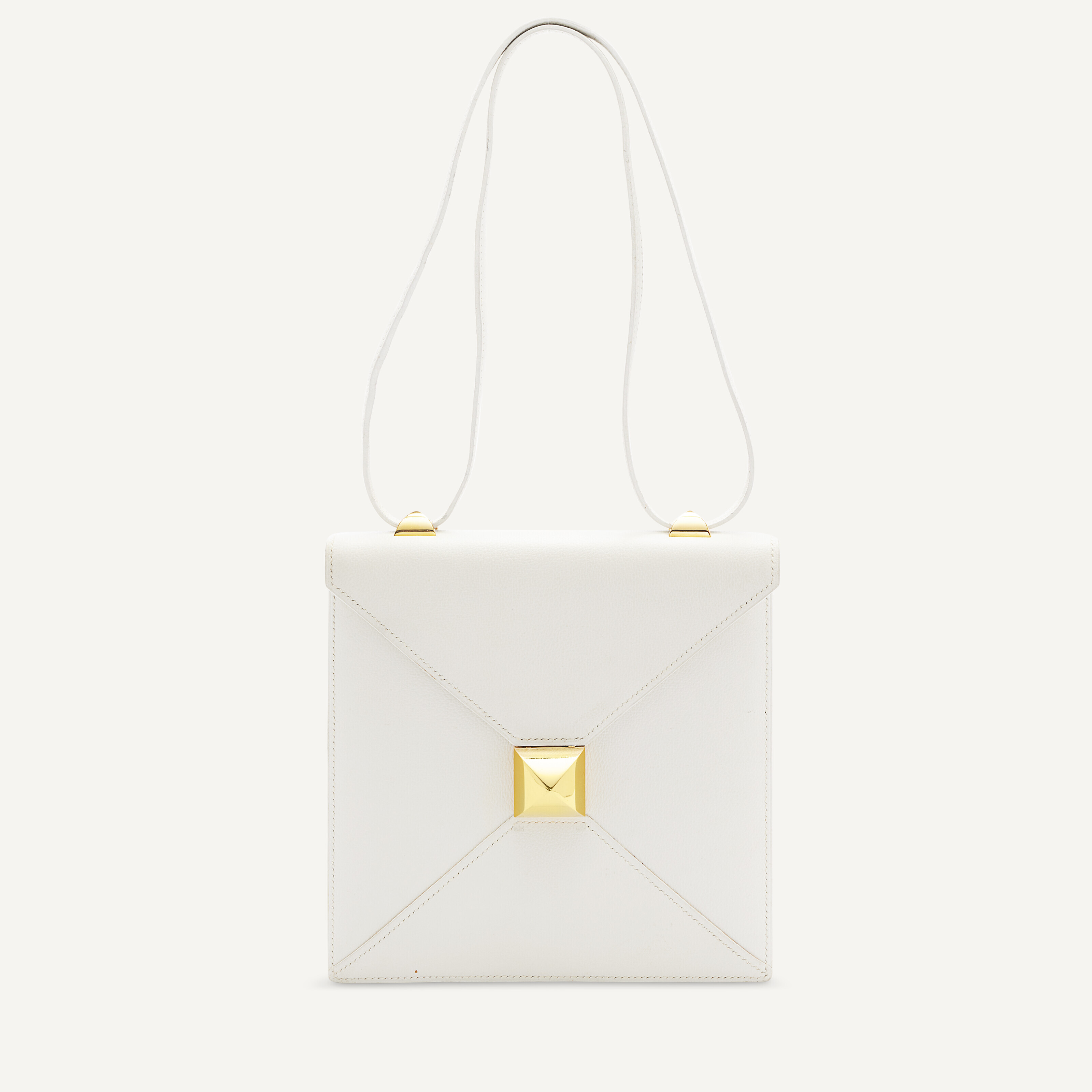 A WHITE CALFSKIN LEATHER MADER WITH GOLD HARDWARE, HERMÈS, 1994 ...