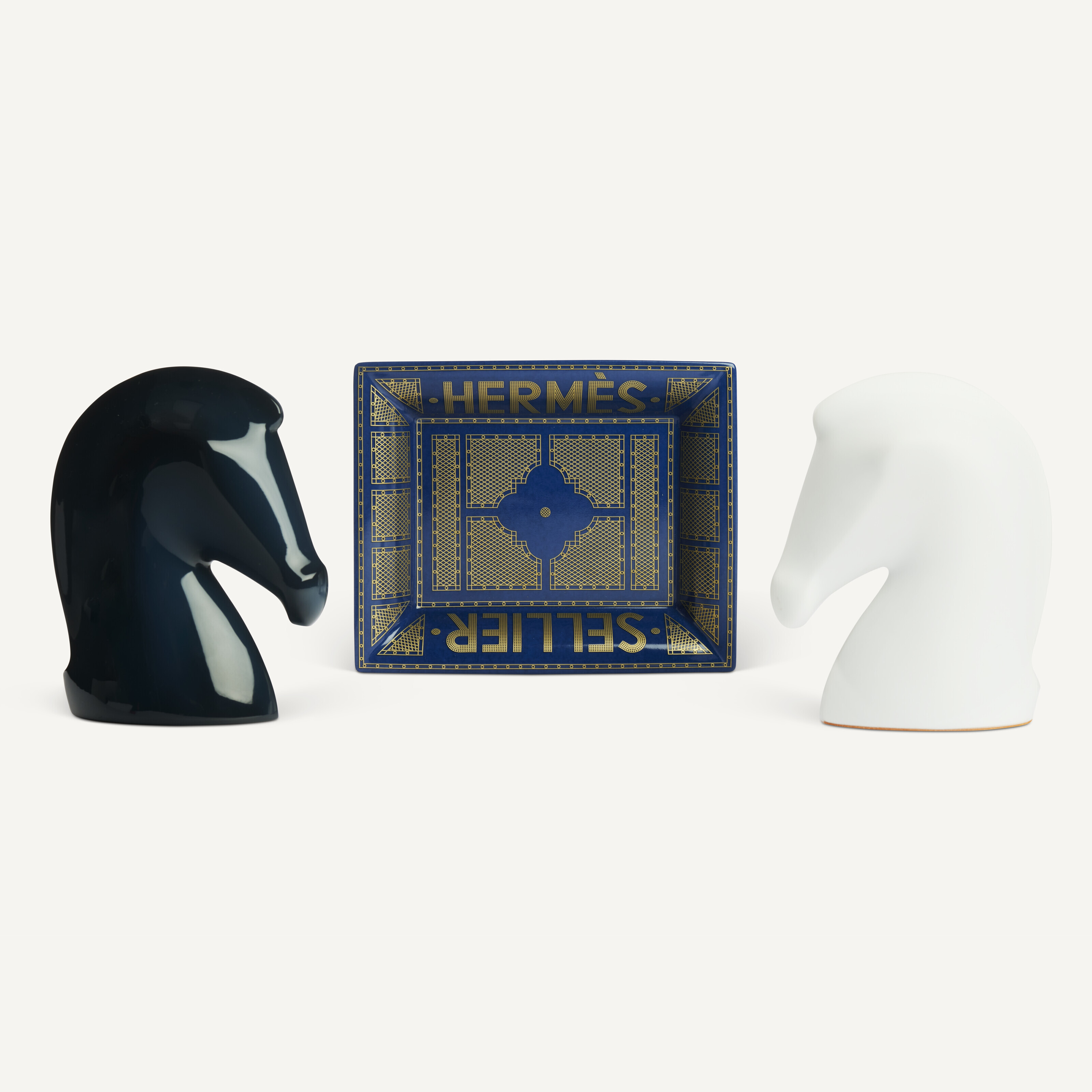 A GROUP OF THREE: A BISCUIT PORCELAIN SAMARCANDE & A DARK BLUE PATINÉ ...