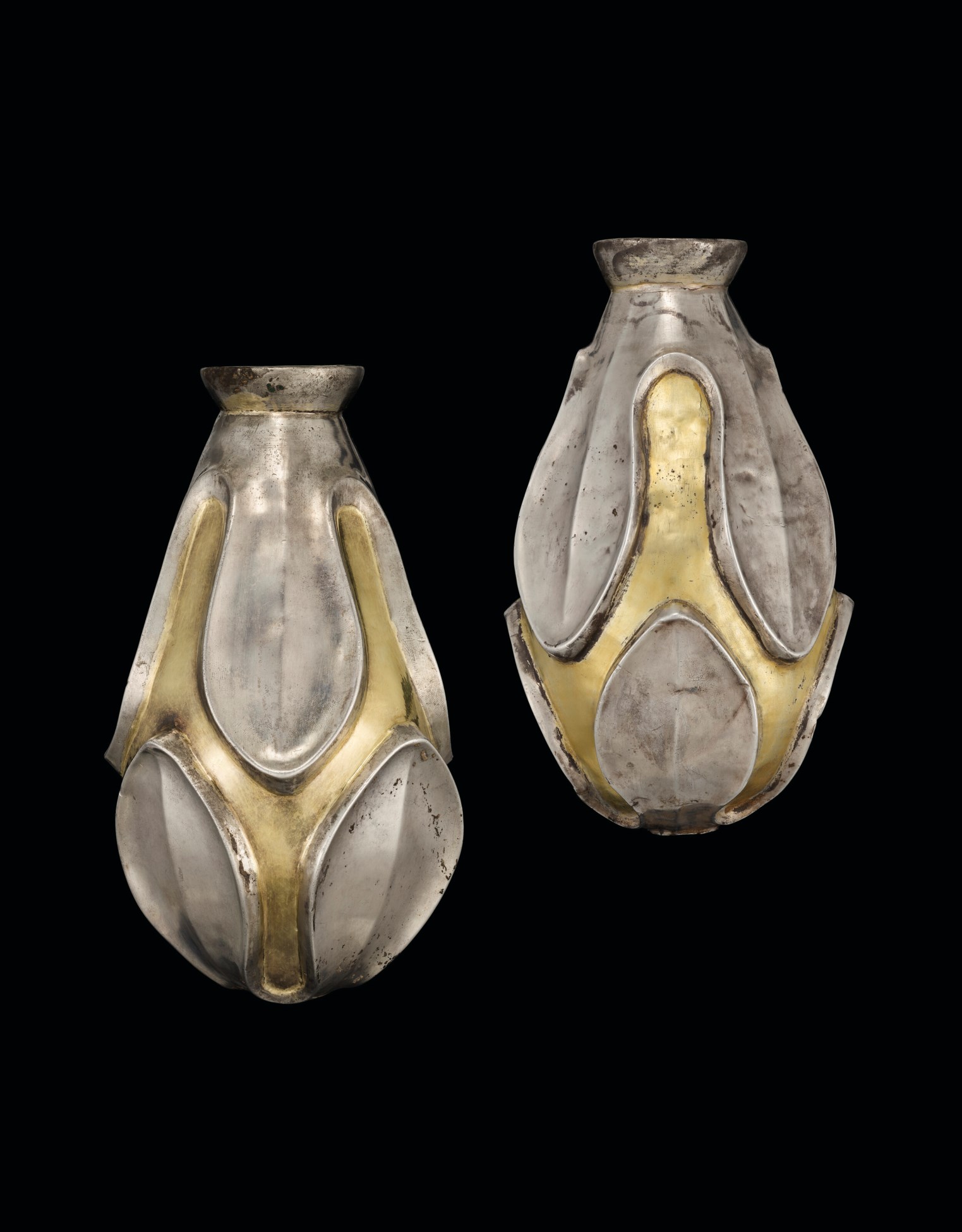 A RARE PAIR OF 'BEVELLED' SASANIAN SILVER BOTTLES, IRAN, 6TH OR 7TH ...