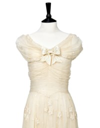 A ROYAL BRIDESMAID'S DRESS AND HEADDRESS, BY NORMAN HARTNELL, 1947, THE ...