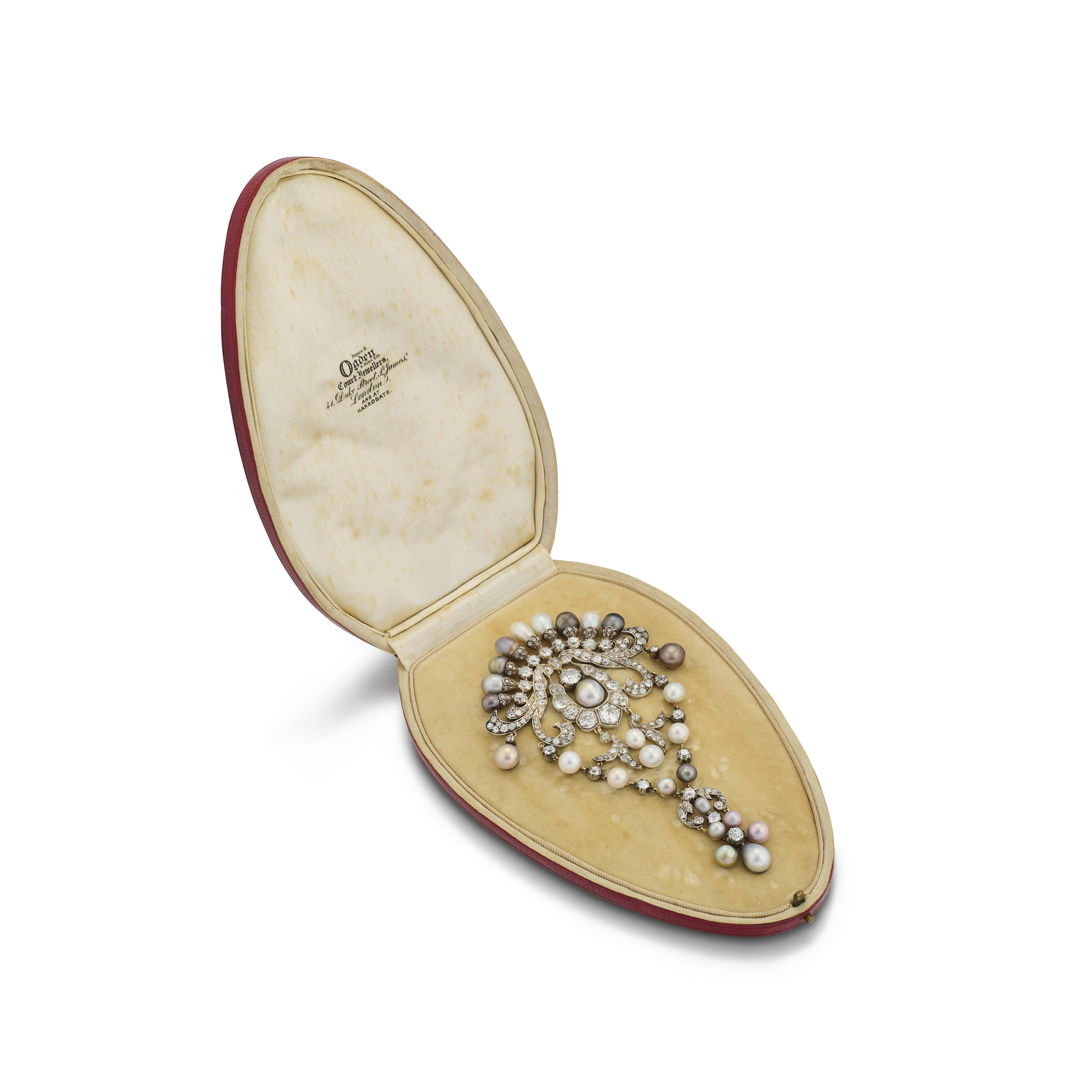 EARLY 20TH CENTURY NATURAL PEARL AND DIAMOND STOMACHER BROOCH, | Christie’s
