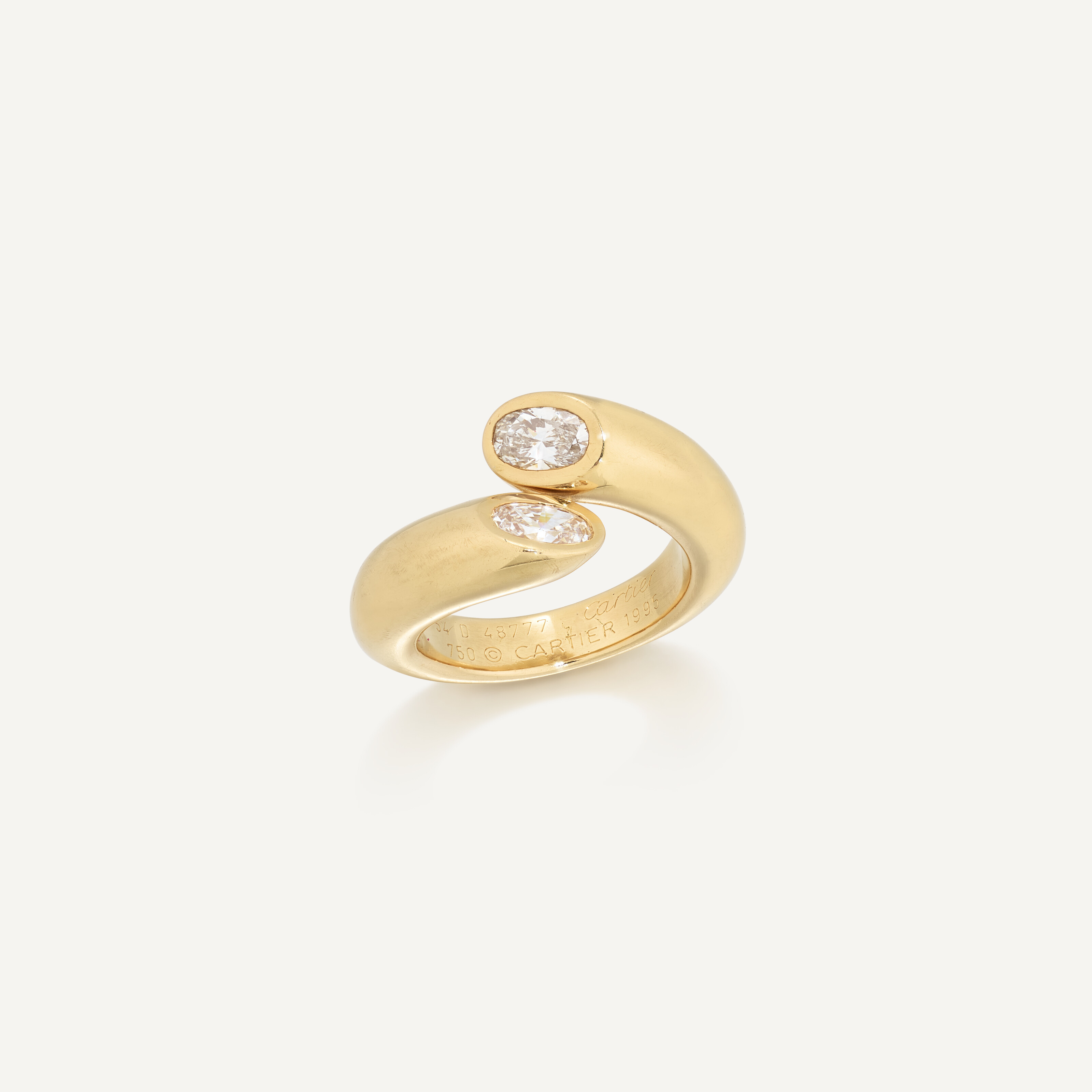 CARTIER DIAMOND 'ELLIPSE DEUX TÊTES CROISÉES' RING, | Christie’s