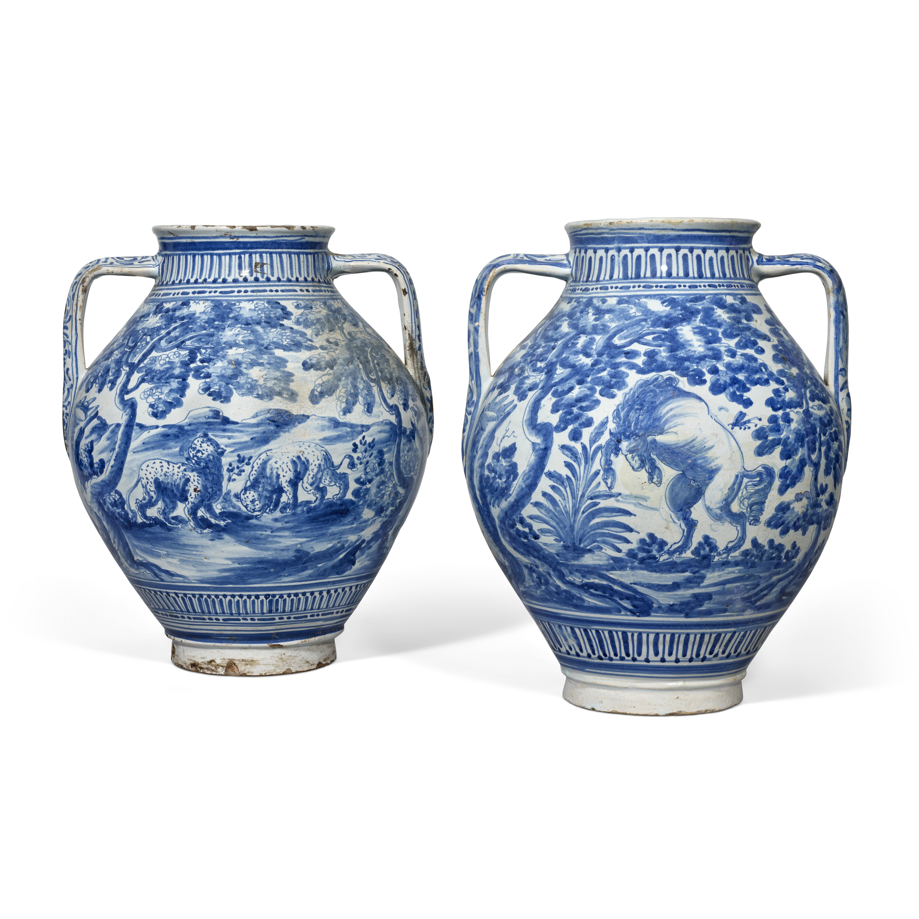 A PAIR OF TALAVERA MAIOLICA LARGE OVIFORM BLUE AND WHITE TWO-HANDLED ...