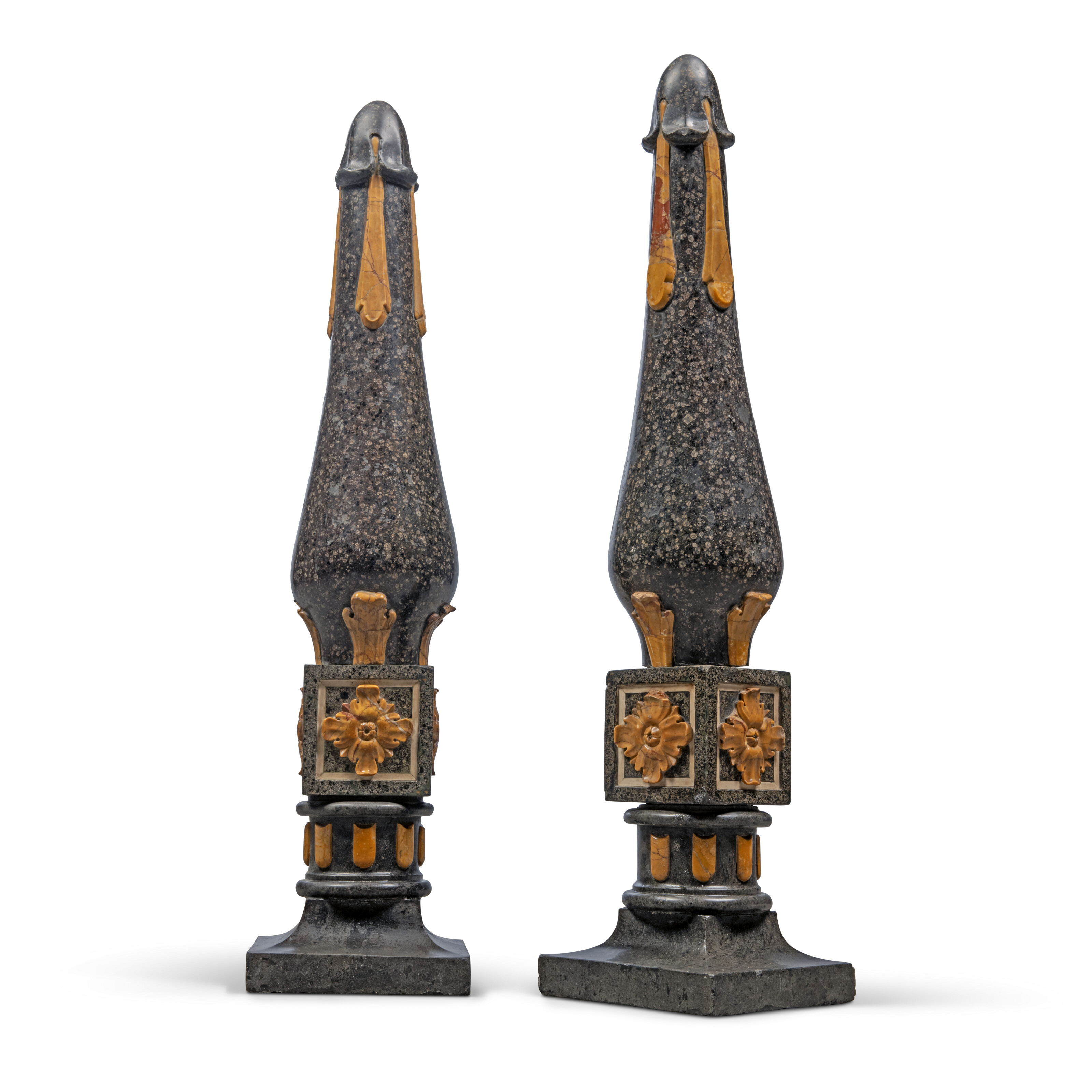 A PAIR OF ITALIAN GIALLO DI SIENA AND BLACK FOSSILISED MARBLE FINIALS ...