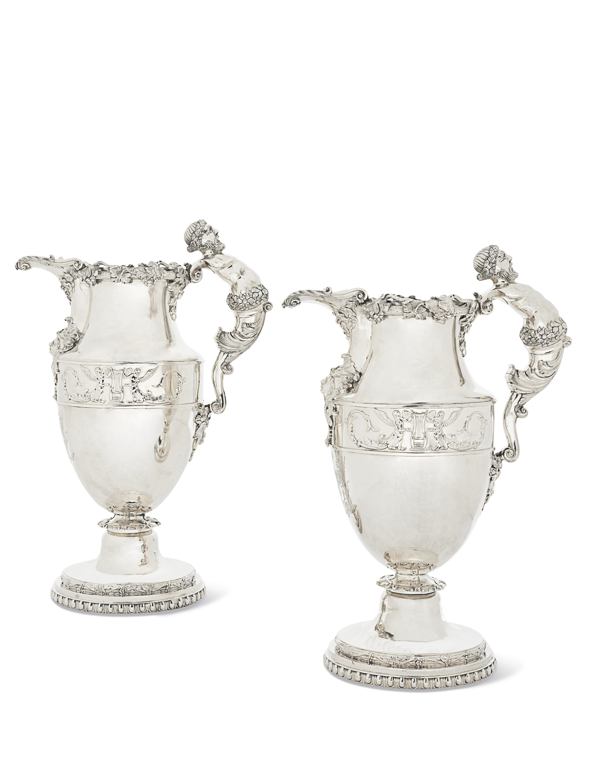 A PAIR OF GEORGE III SILVER EWERS, MARK OF THOMAS HOLLAND, LONDON, 1807 ...