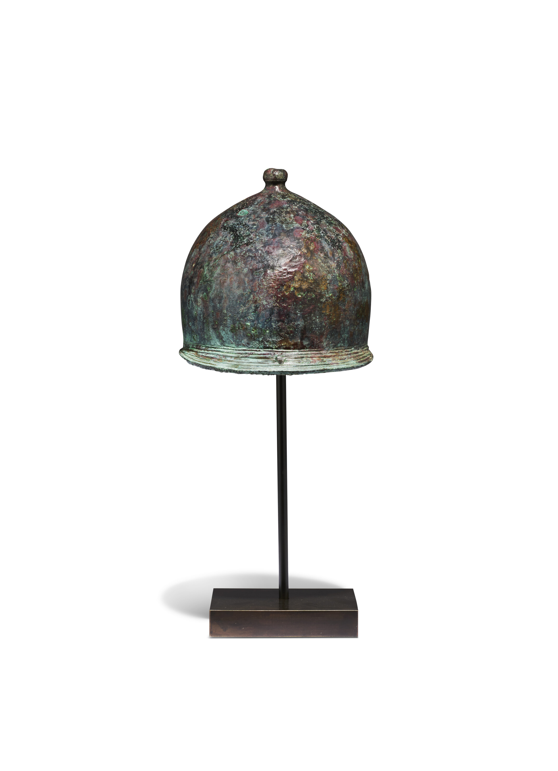 AN ITALIC BRONZE MONTEFORTINO HELMET, CIRCA 300-200 B.C. | Christie’s