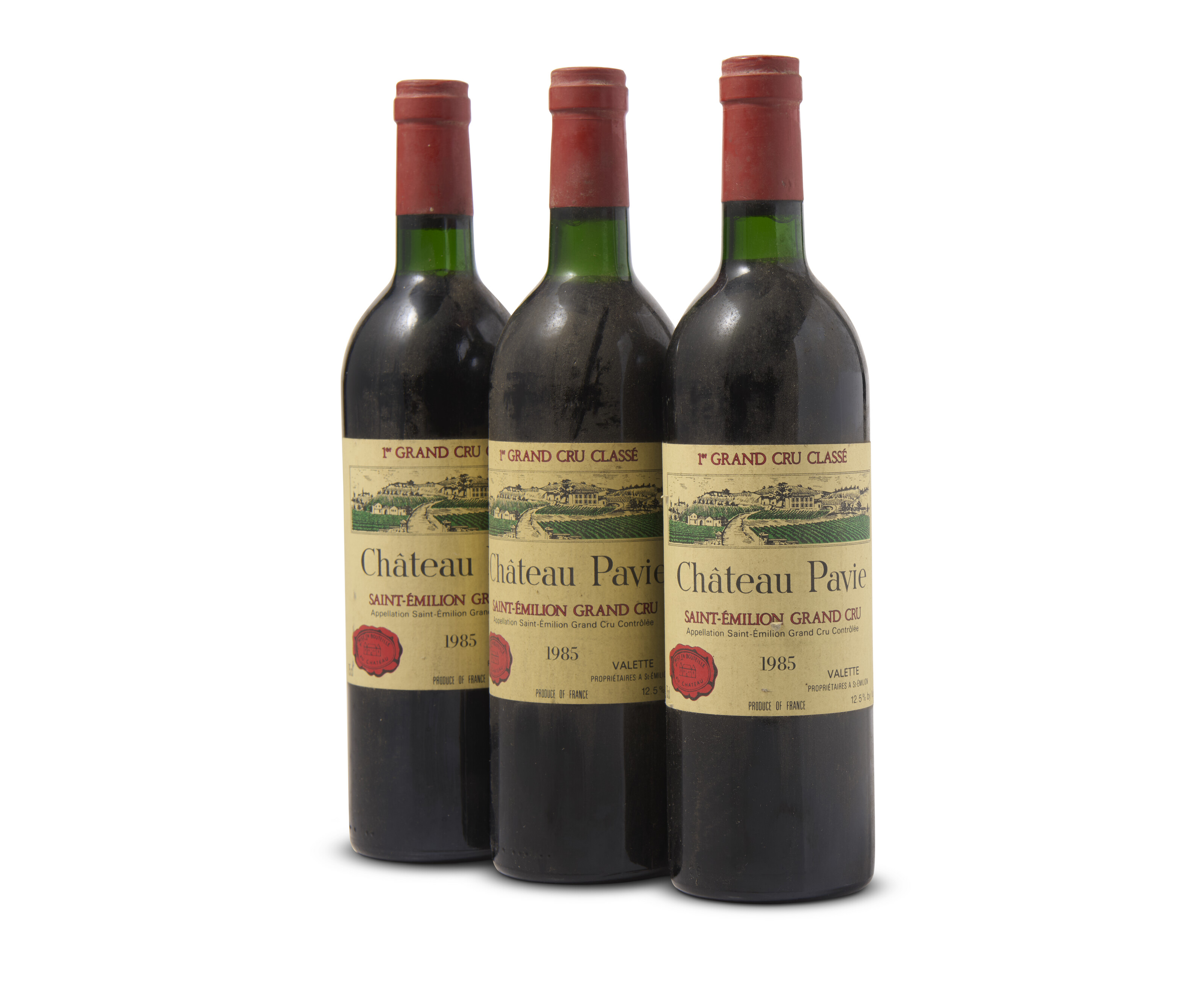 Château Pavie 1985, Bin-soiled labels. Levels: two base of neck and one ...