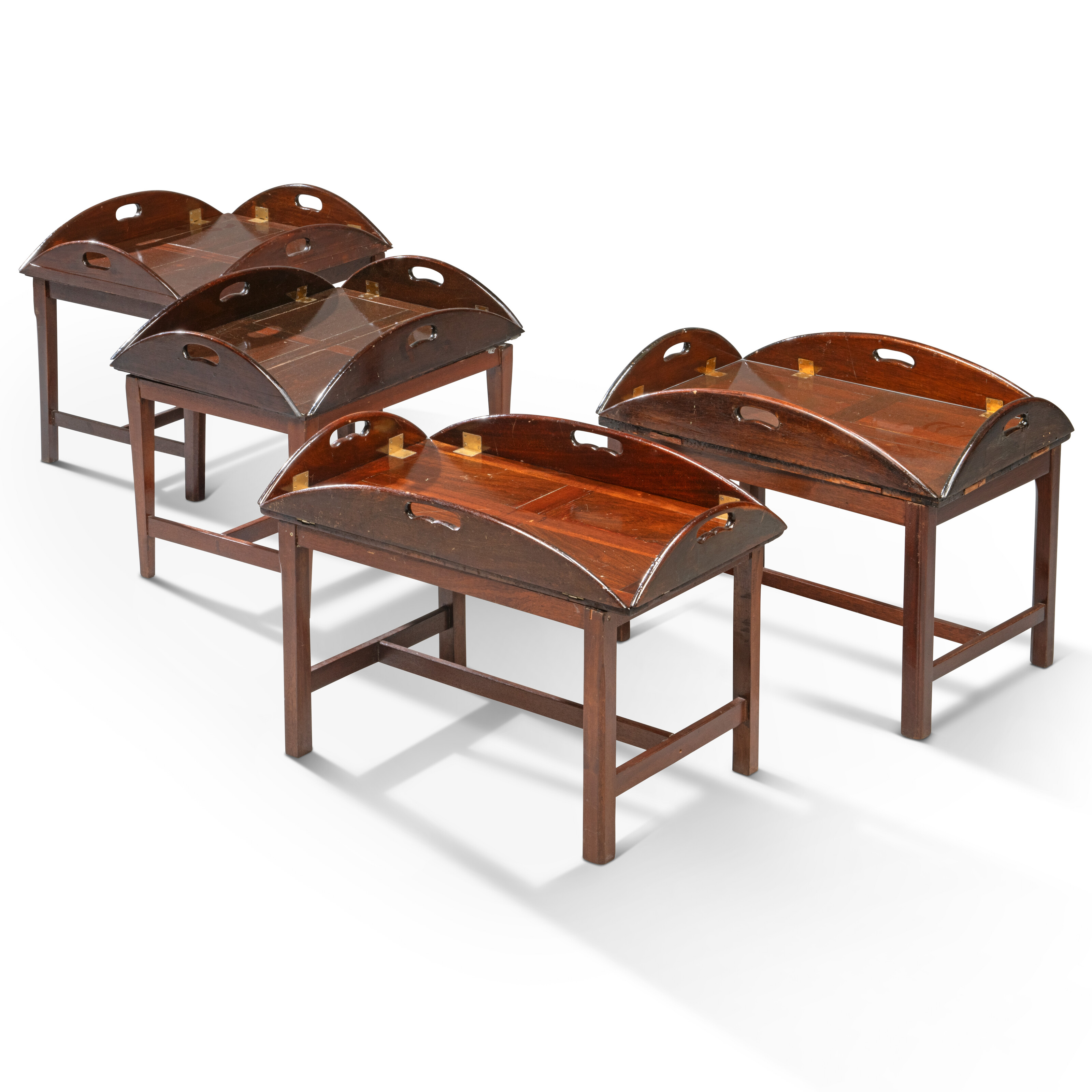 A GROUP OF FOUR MAHOGANY OVAL BUTLER'S TRAY TABLES, 20TH CENTURY ...