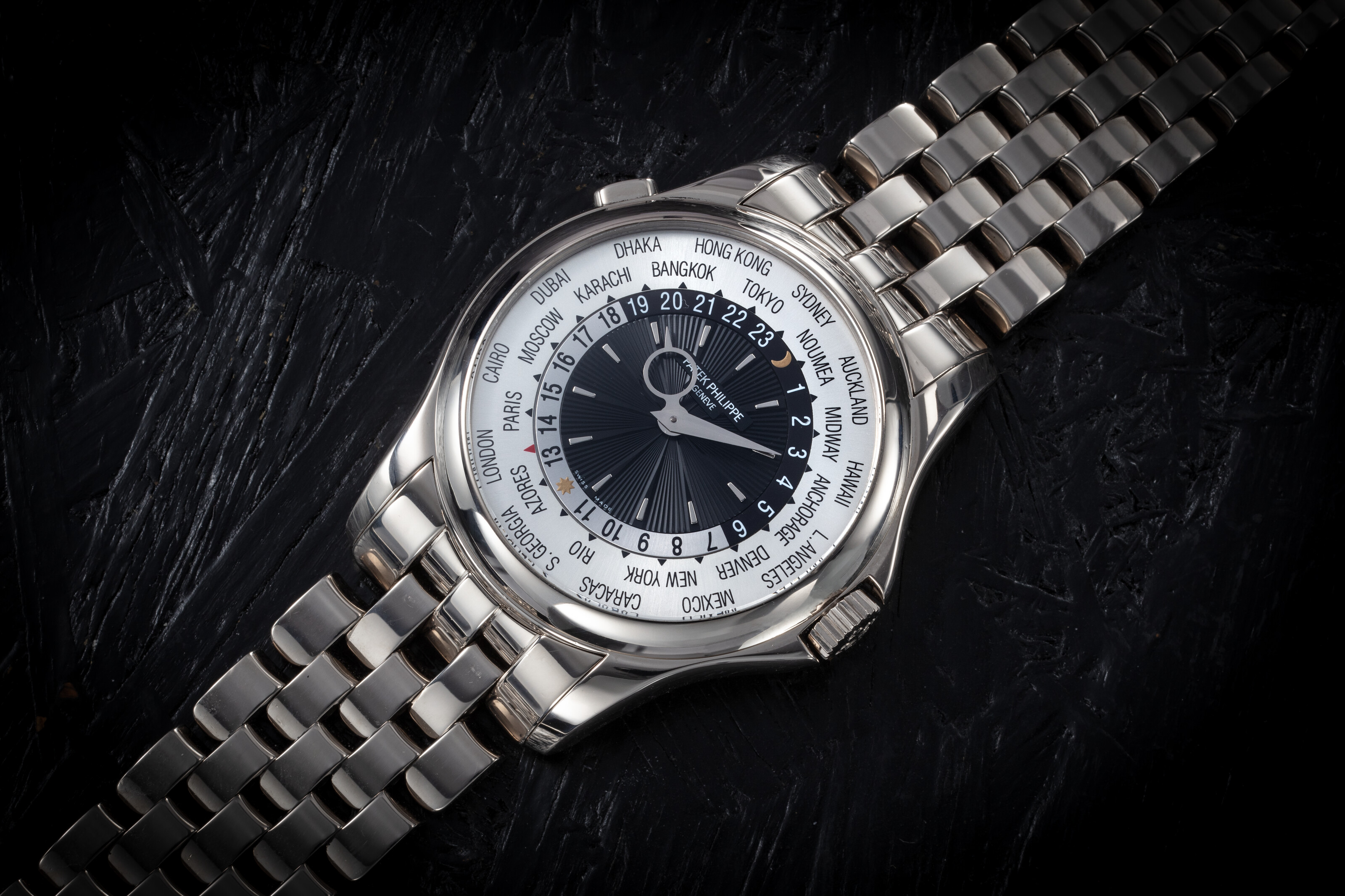PATEK PHILIPPE, REF. 5130/1G-010, A FINE GOLD AUTOMATIC WORLD TIME ...