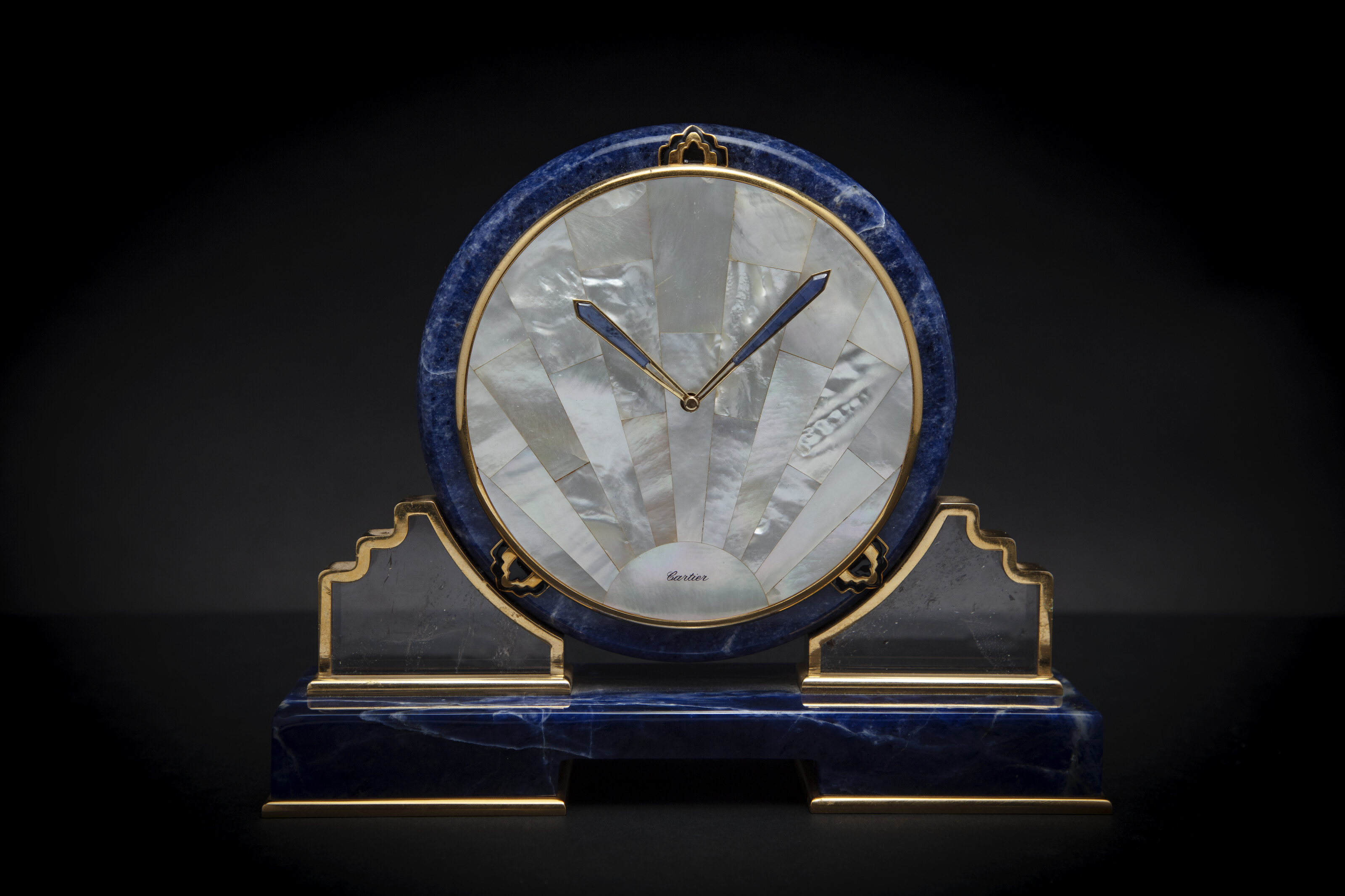 CARTIER, AN ATTRACTIVE LAPIS LAZULI DESK CLOCK WITH MOTHER OF PEARL ...