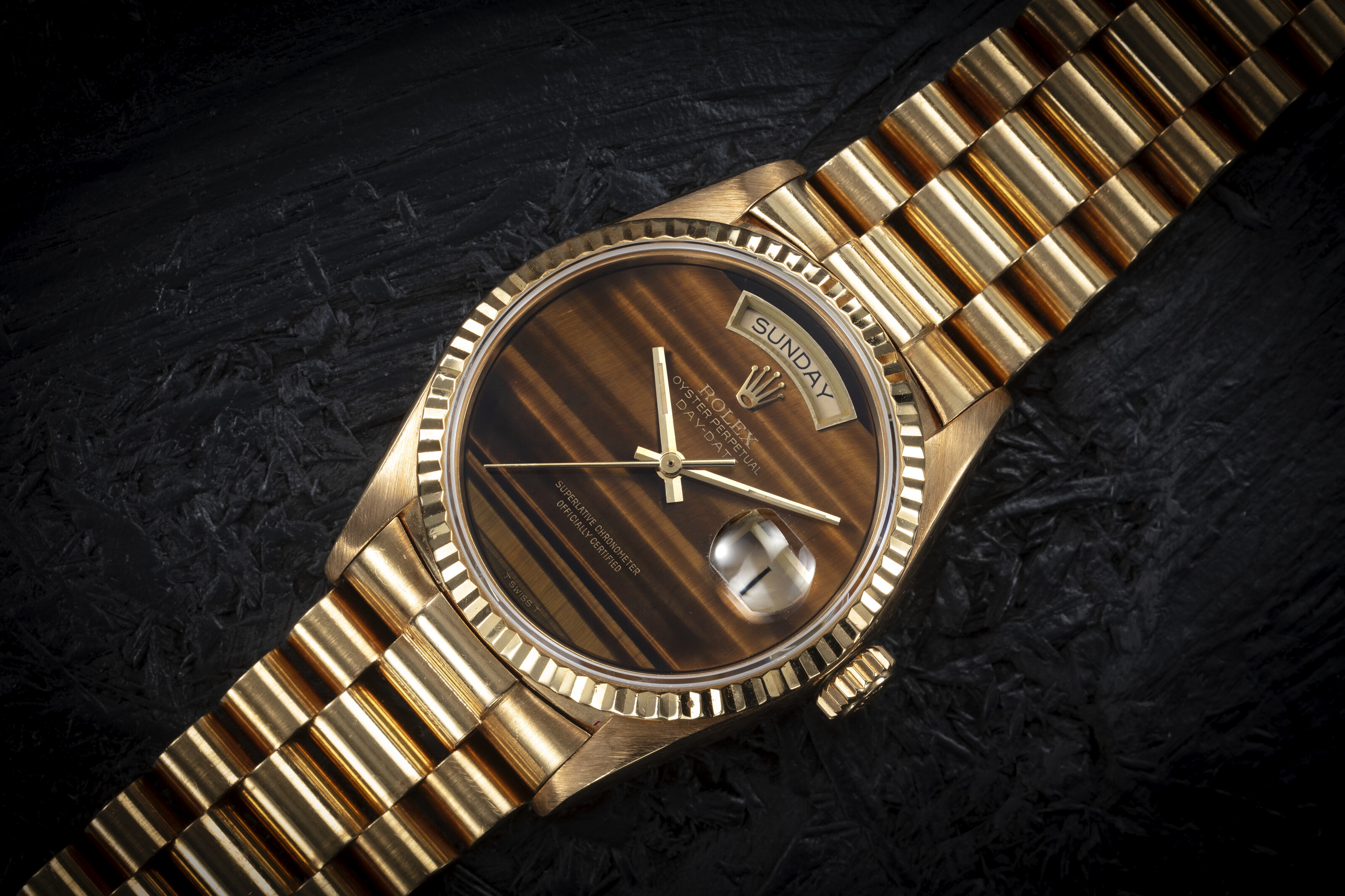 ROLEX, DAY-DATE REF. 18038, A GOLD AUTOMATIC WRISTWATCH WITH TIGER EYE ...