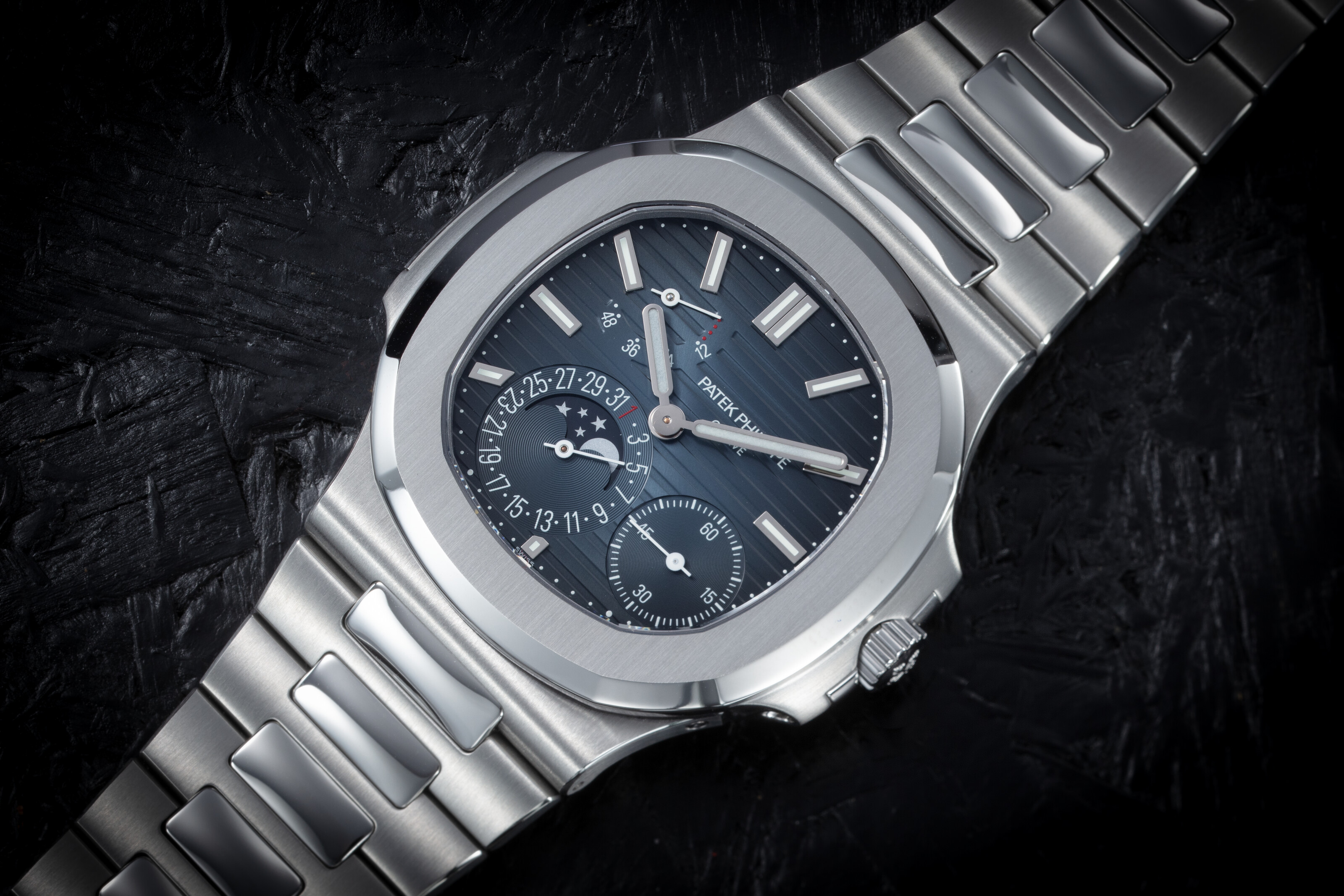PATEK PHILIPPE, NAUTILUS REF. 5712/A-001, A FINE STEEL AUTOMATIC ...