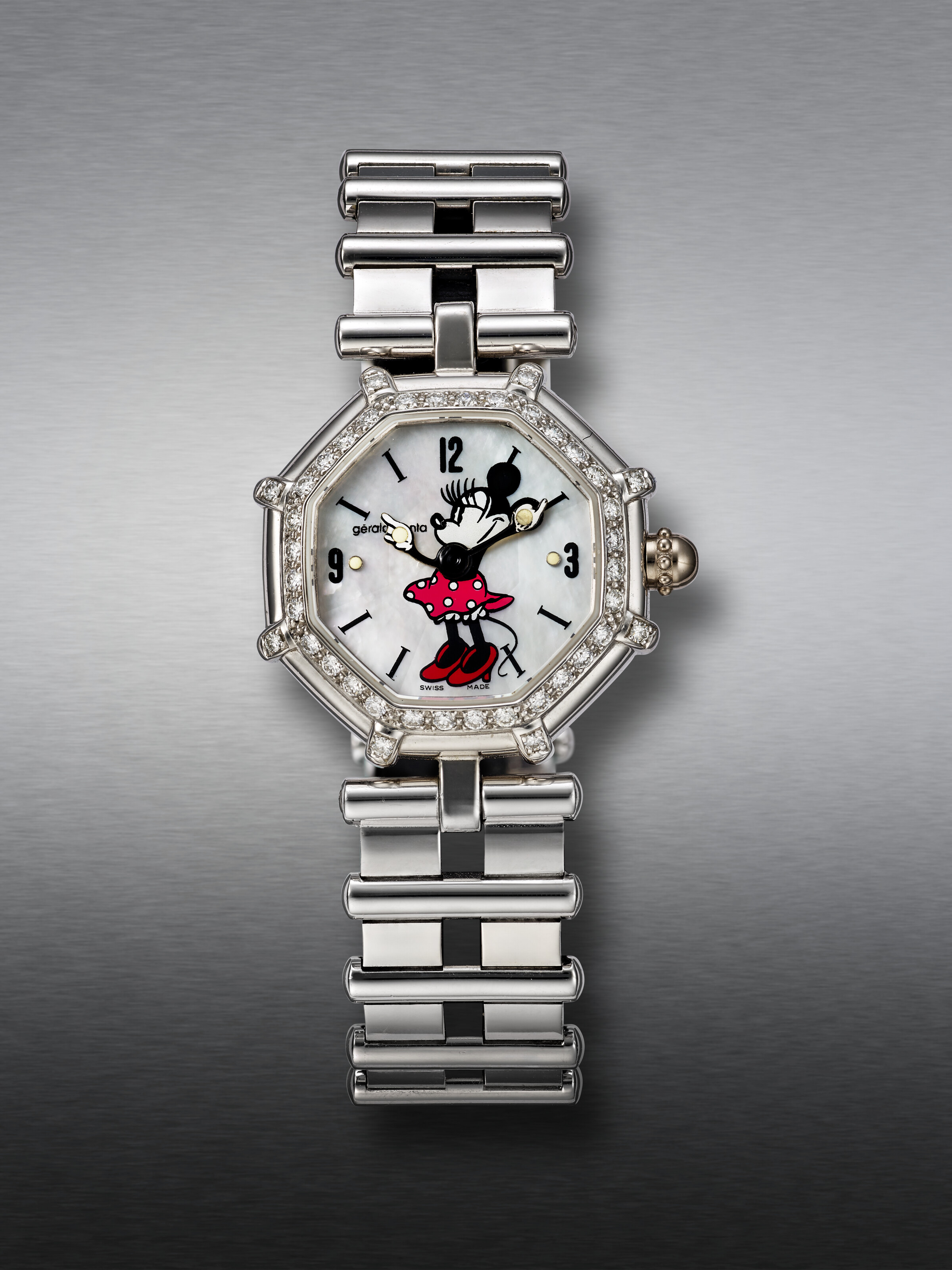 GERALD GENTA, WHITE GOLD AND DIAMOND-SET 'MINNIE MOUSE', WITH MOTHER-OF ...