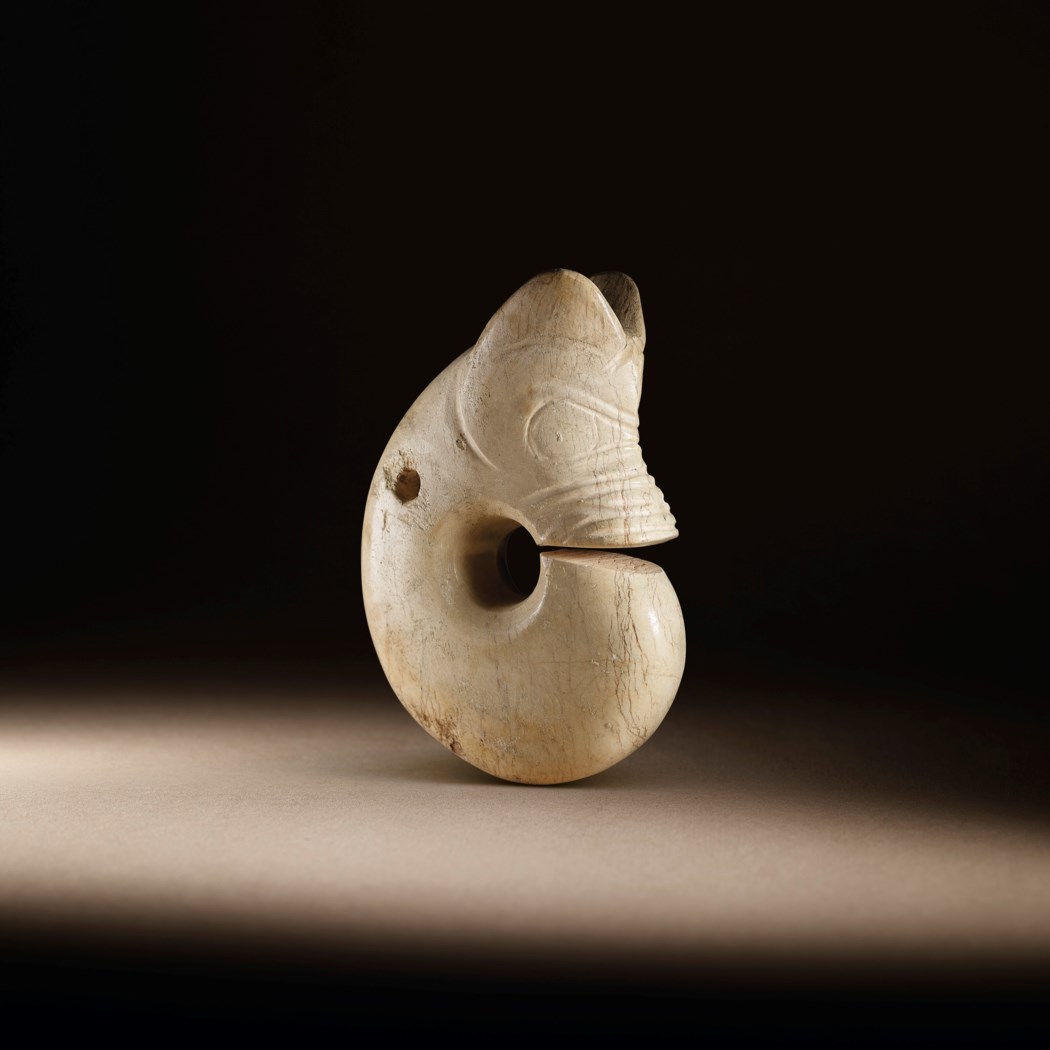 A LARGE JADE CARVING OF A 'PIG-DRAGON', HONGSHAN CULTURE, CIRCA 3900 ...