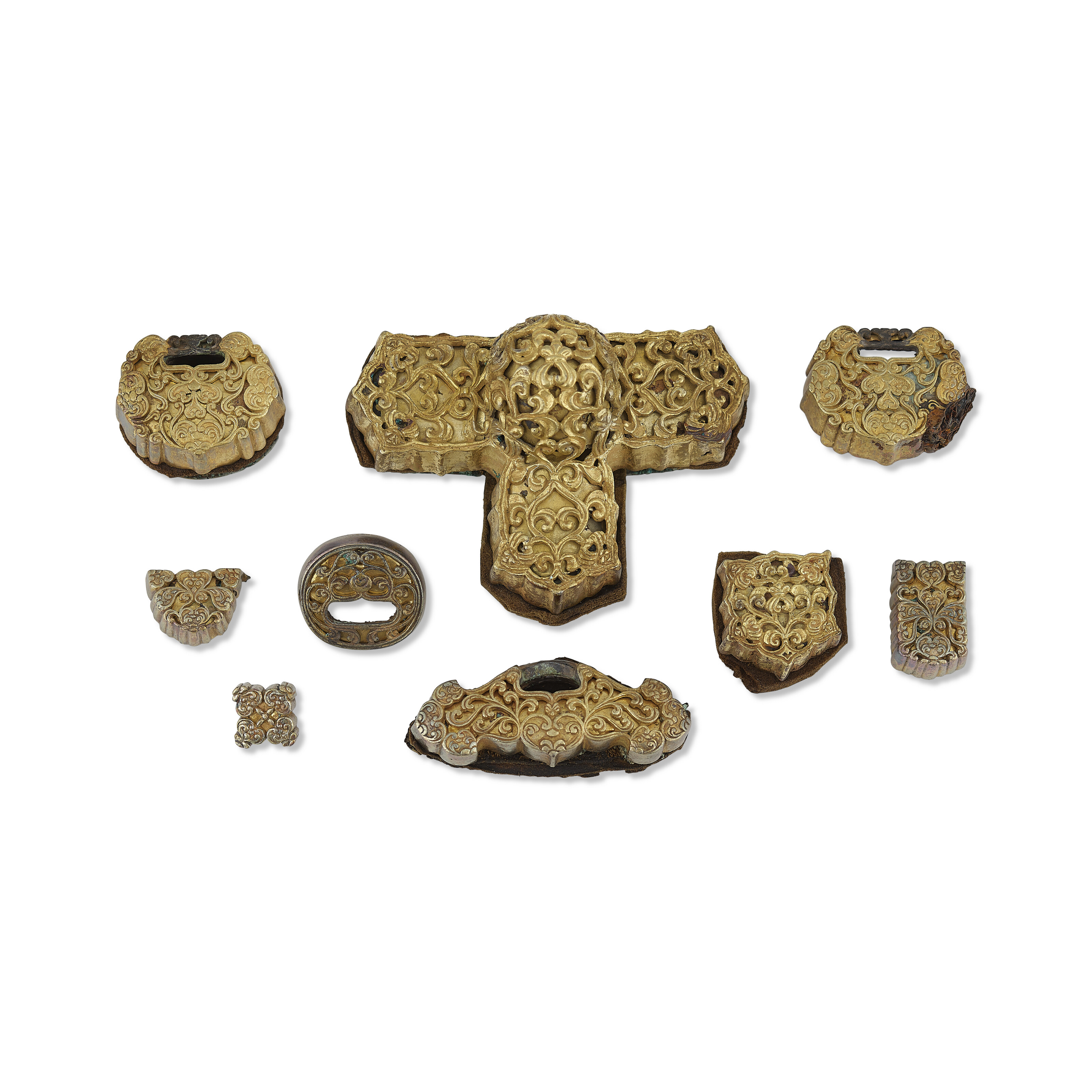 A SET OF NINE FINELY CAST GILT-BRONZE HORSE TRAPPINGS, LIAO DYNASTY ...