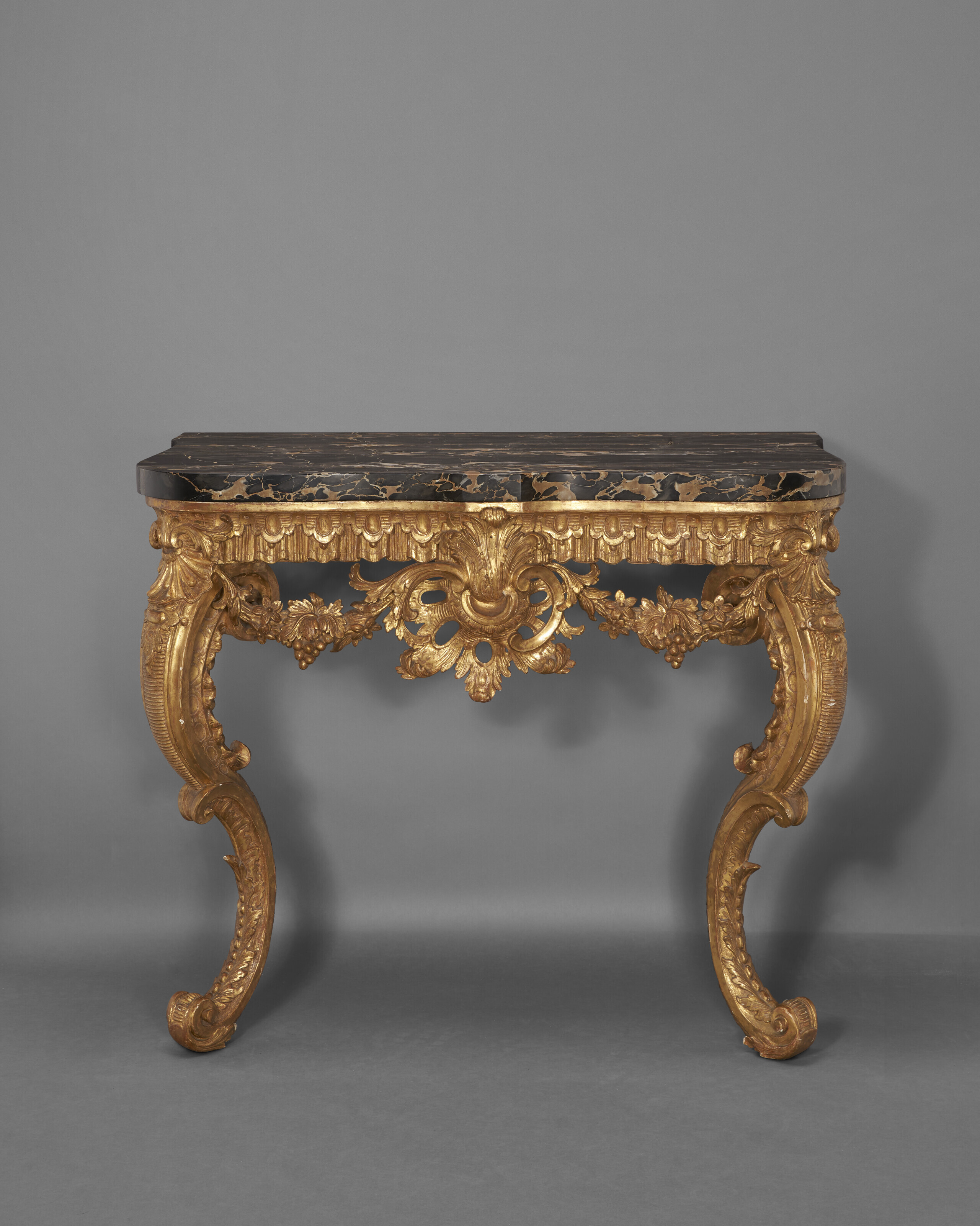 A GEORGE II GILTWOOD SIDE TABLE, CIRCA 1750 | Christie’s