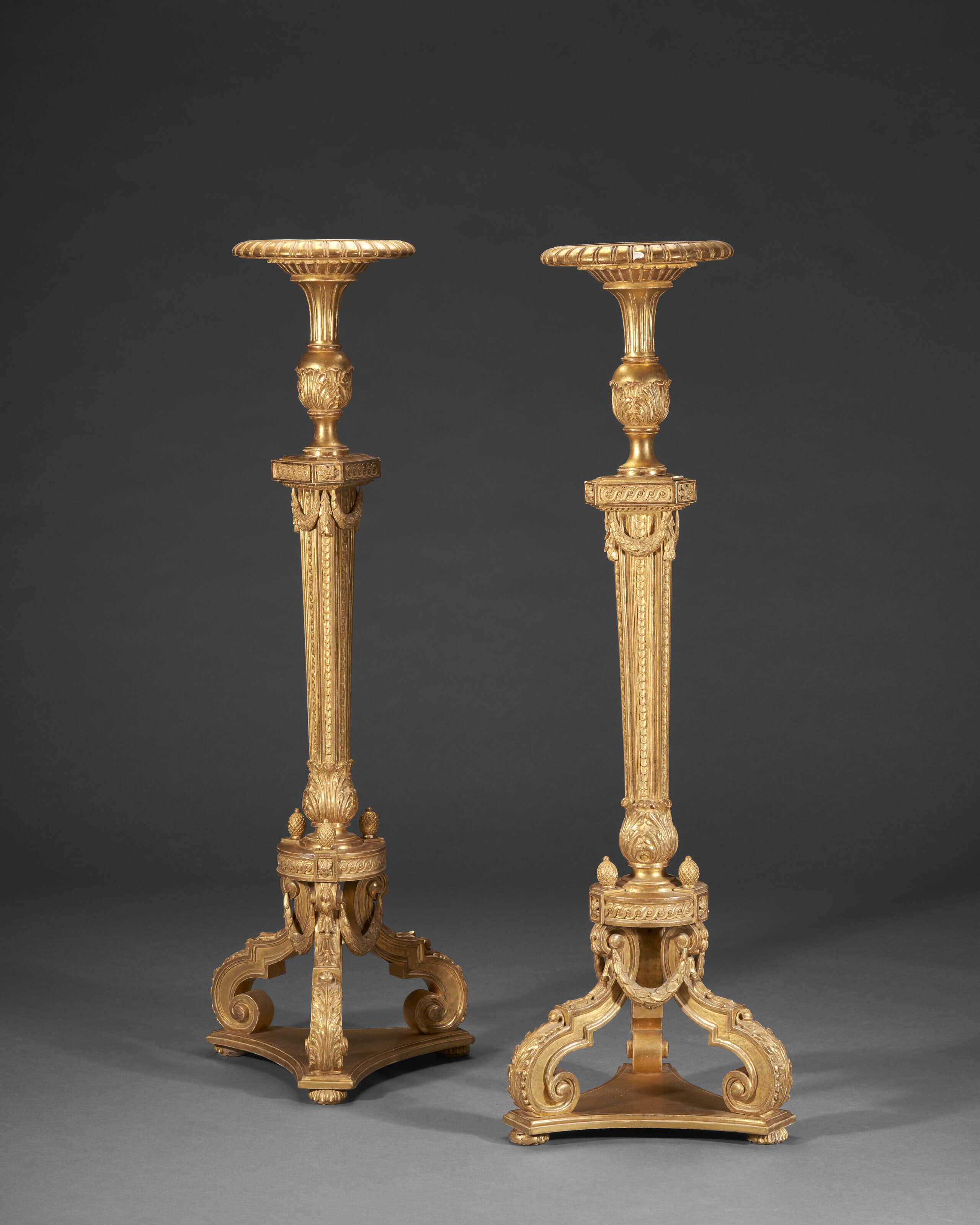 A PAIR OF NORTH EUROPEAN GILTWOOD TORCHERES, 19TH CENTURY | Christie’s