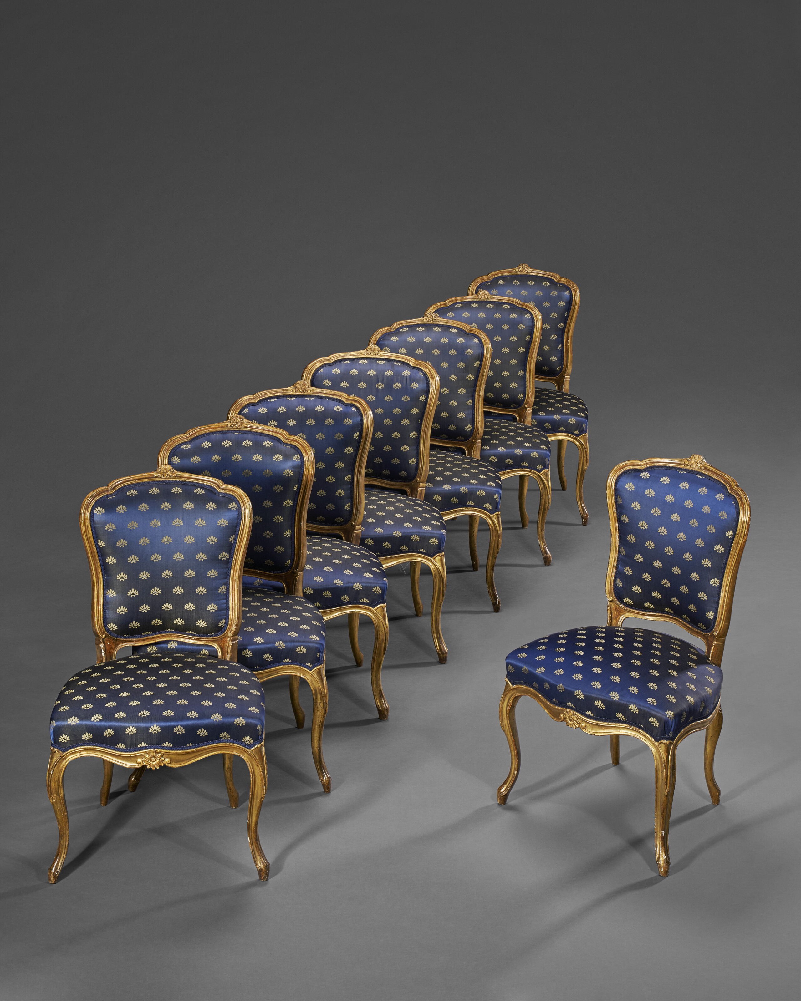 A SET OF EIGHT NORTH ITALIAN GILTWOOD SIDECHAIRS, PROBABLY FLORENCE ...