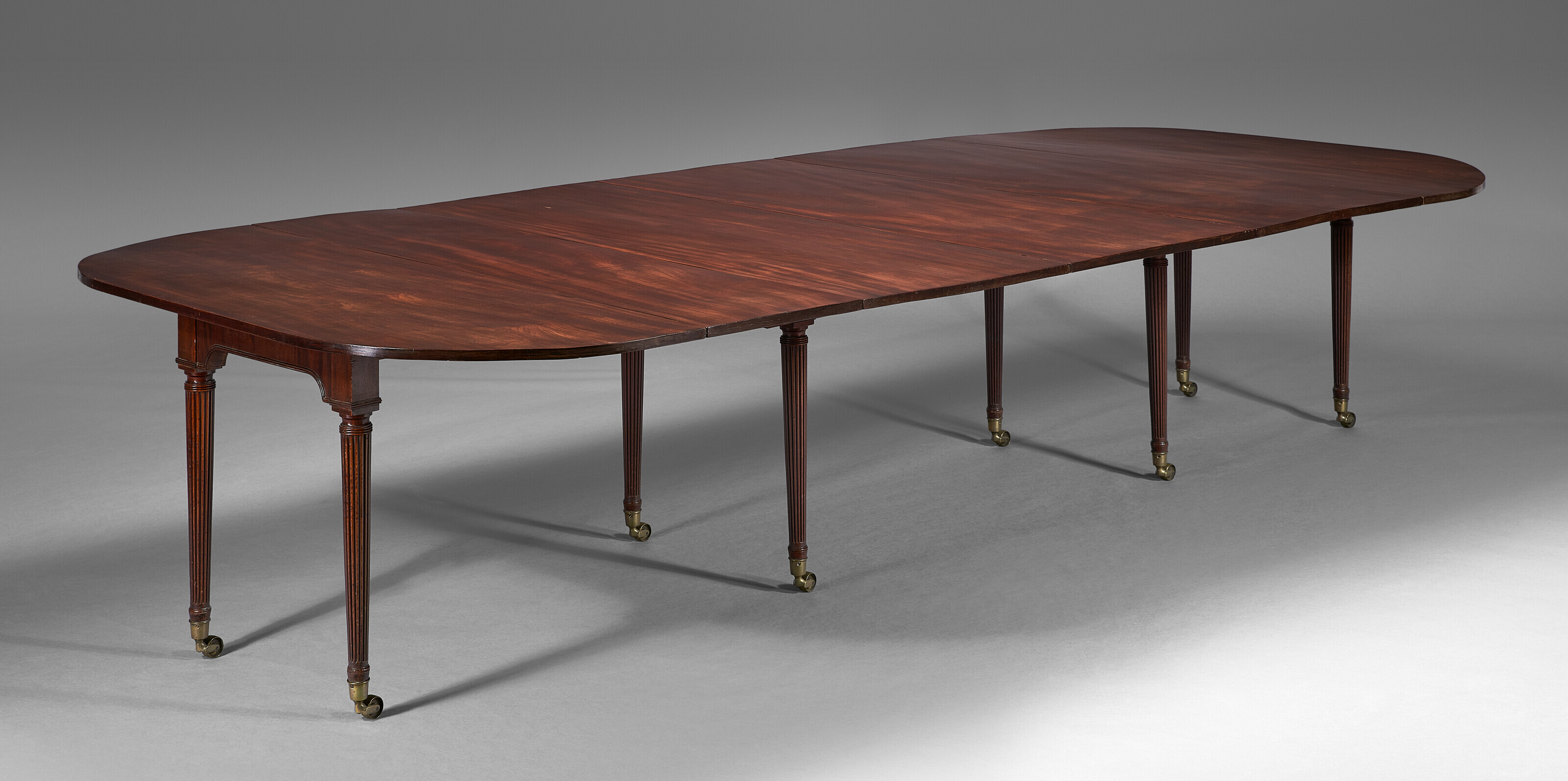 A REGENCY MAHOGANY EXTENDING DINING TABLE, CIRCA 1810 | Christie’s