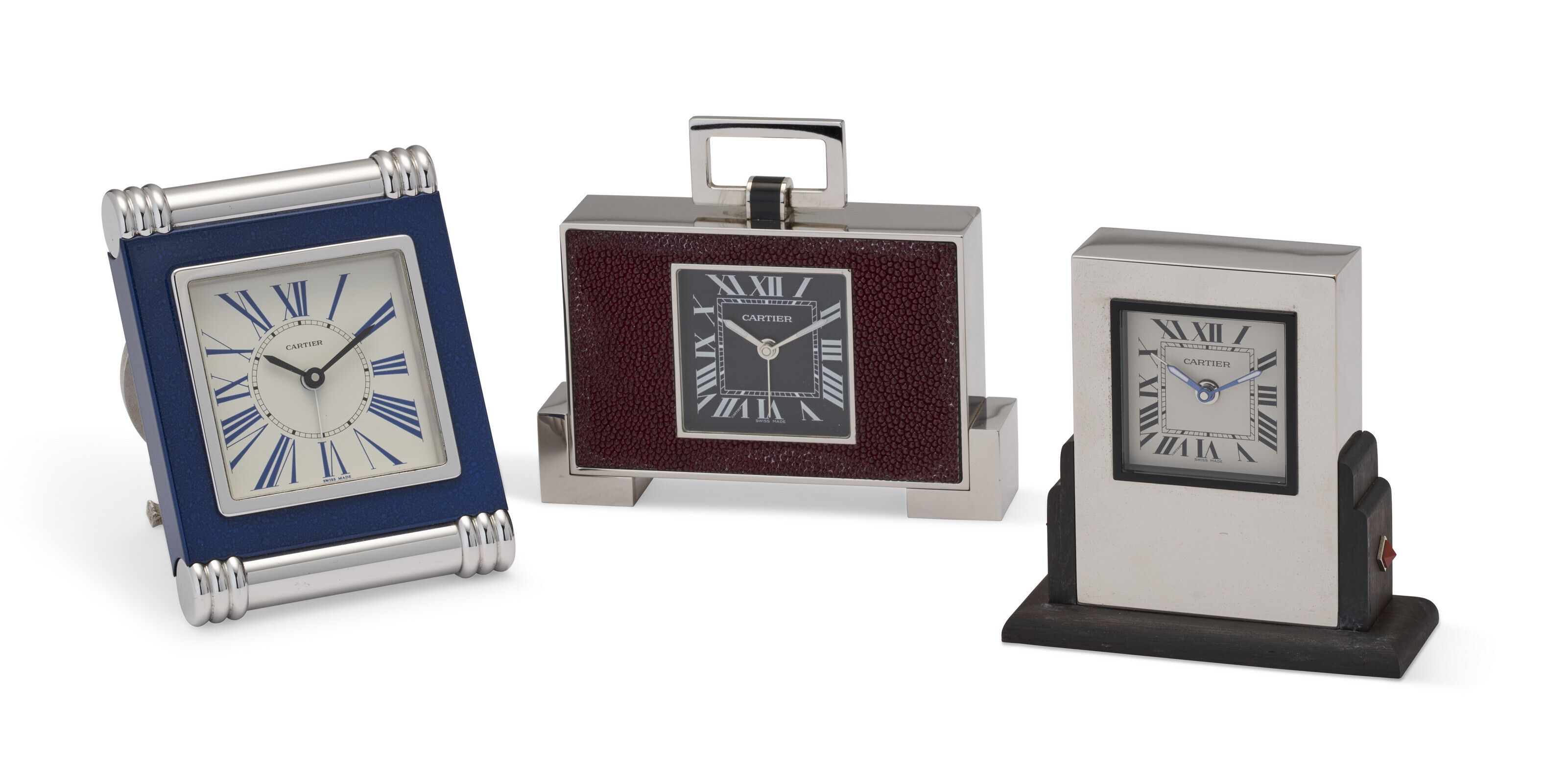 A GROUP OF THREE SILVER-PLATED DESK CLOCKS, BY CARTIER, MODERN | Christie’s