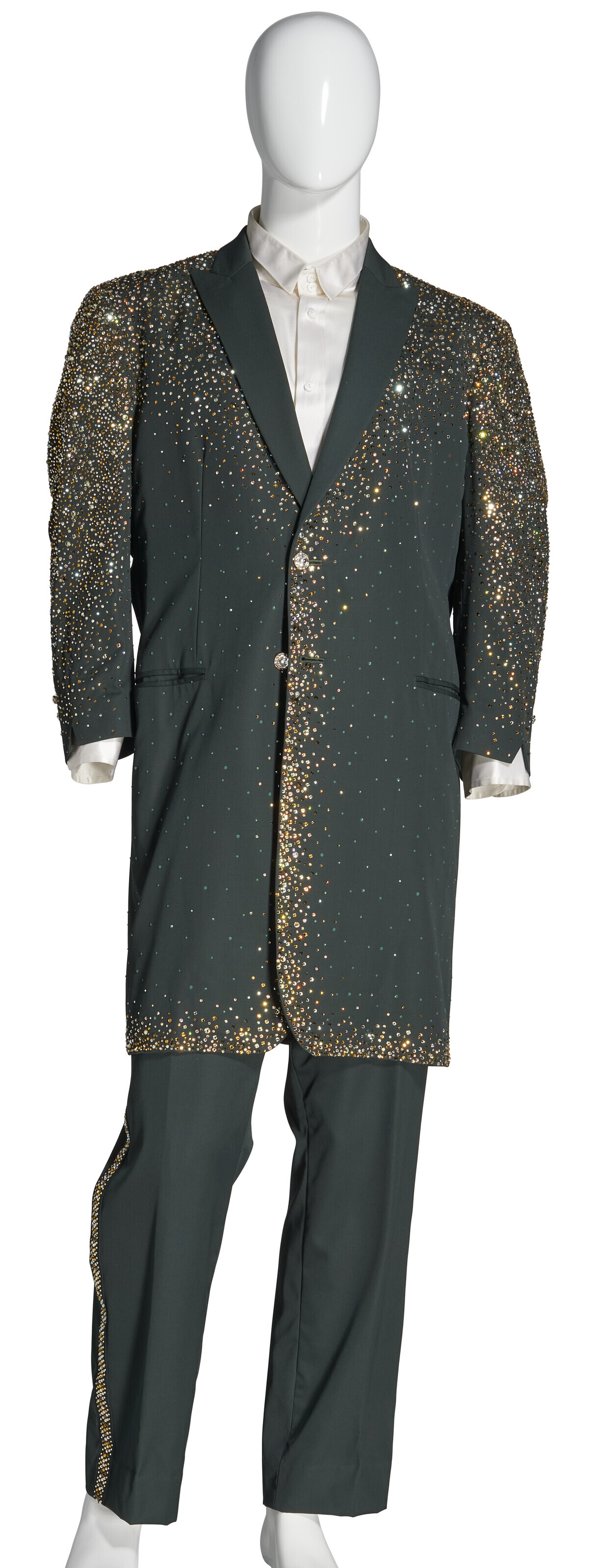 A DARK GREEN 'CAPTAIN FANTASTIC' ENSEMBLE, DESIGNED BY KEITH GREGORY ...
