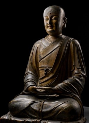 A VERY RARE AND LARGE GILT-BRONZE FIGURE OF A SEATED LUOHAN, SOUTHERN ...