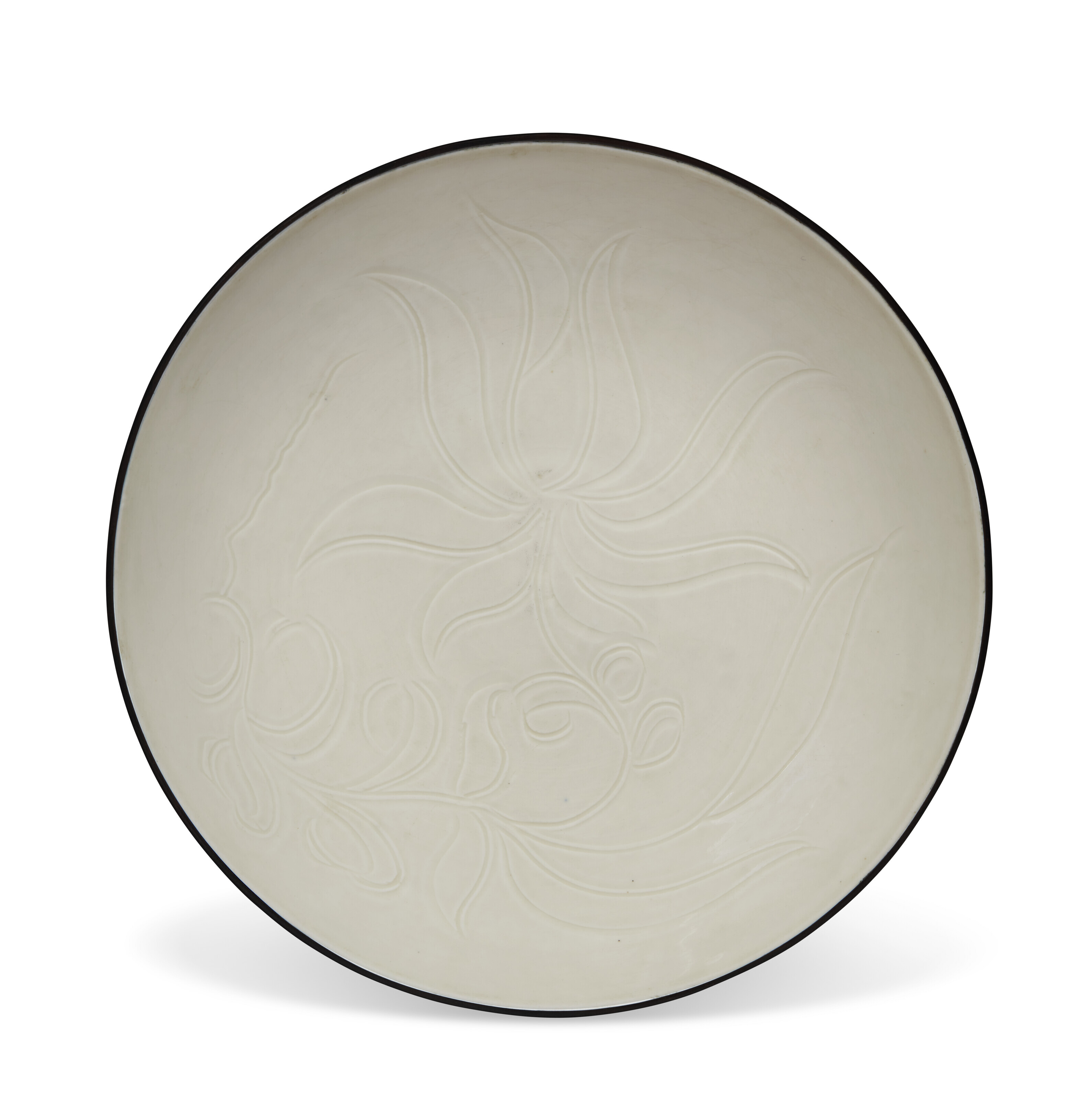 A CARVED WHITE DING-TYPE 'LOTUS' DISH, CHINA | Christie’s