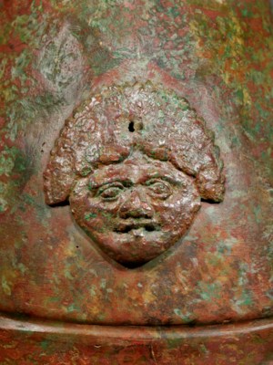A GREEK BRONZE PILOS HELMET WITH A RADIATING CREST, MAGNA GRAECIA ...
