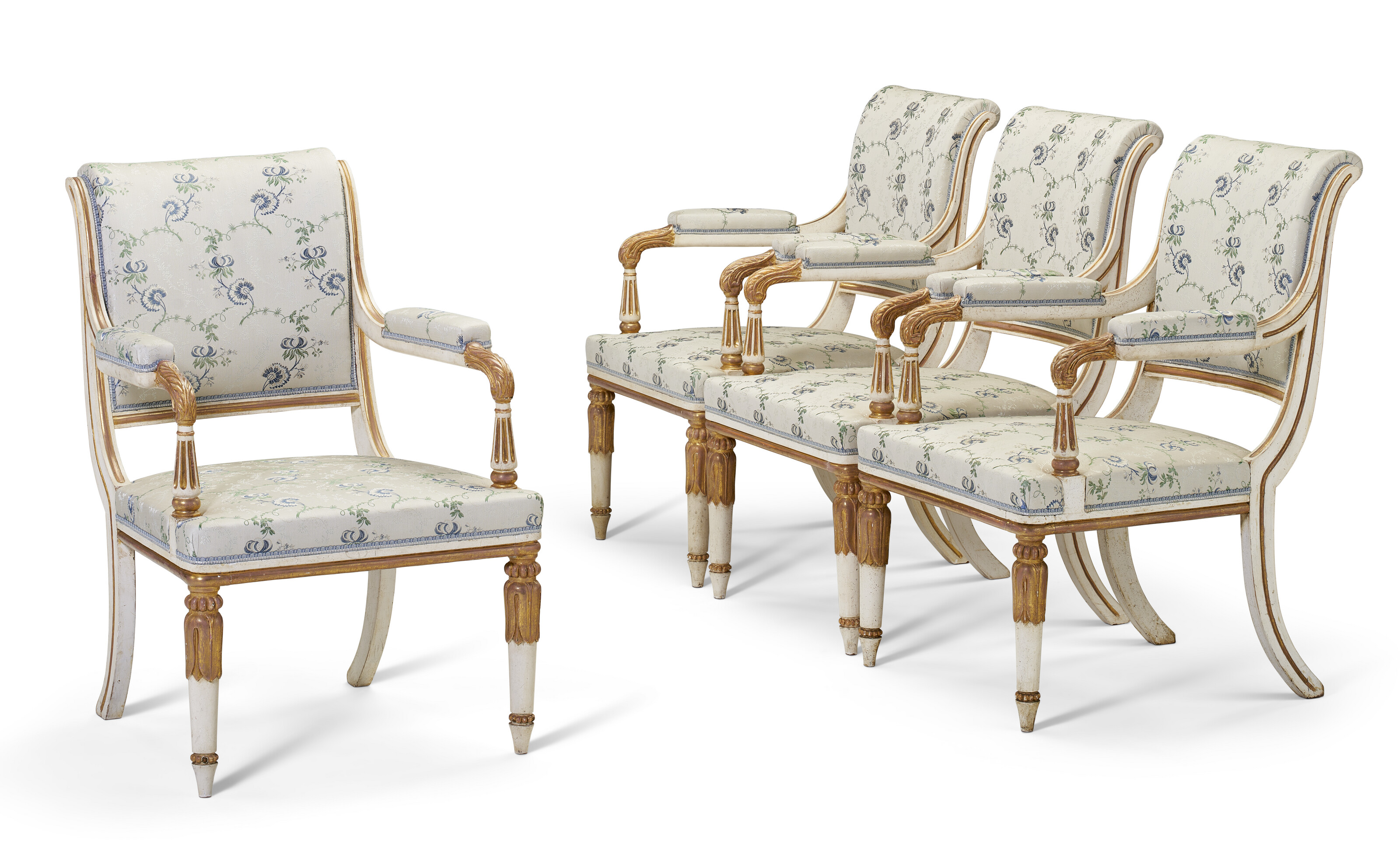 A SET OF FOUR GEORGE III CREAM-PAINTED AND PARCEL-GILT ARMCHAIRS, CIRCA ...