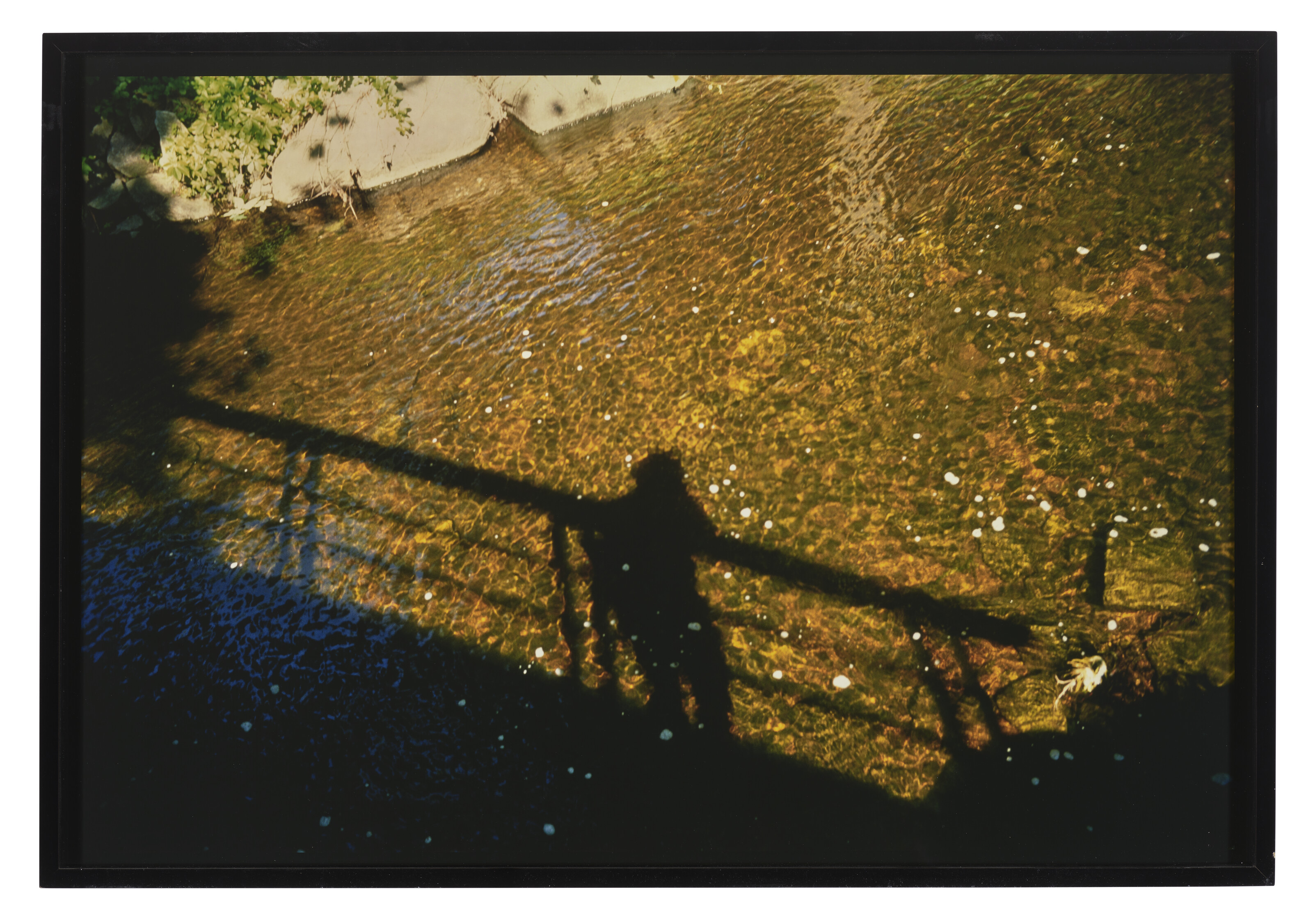 NAN GOLDIN (B. 1953), Self-portrait on Golden river on bridge, Conn ...