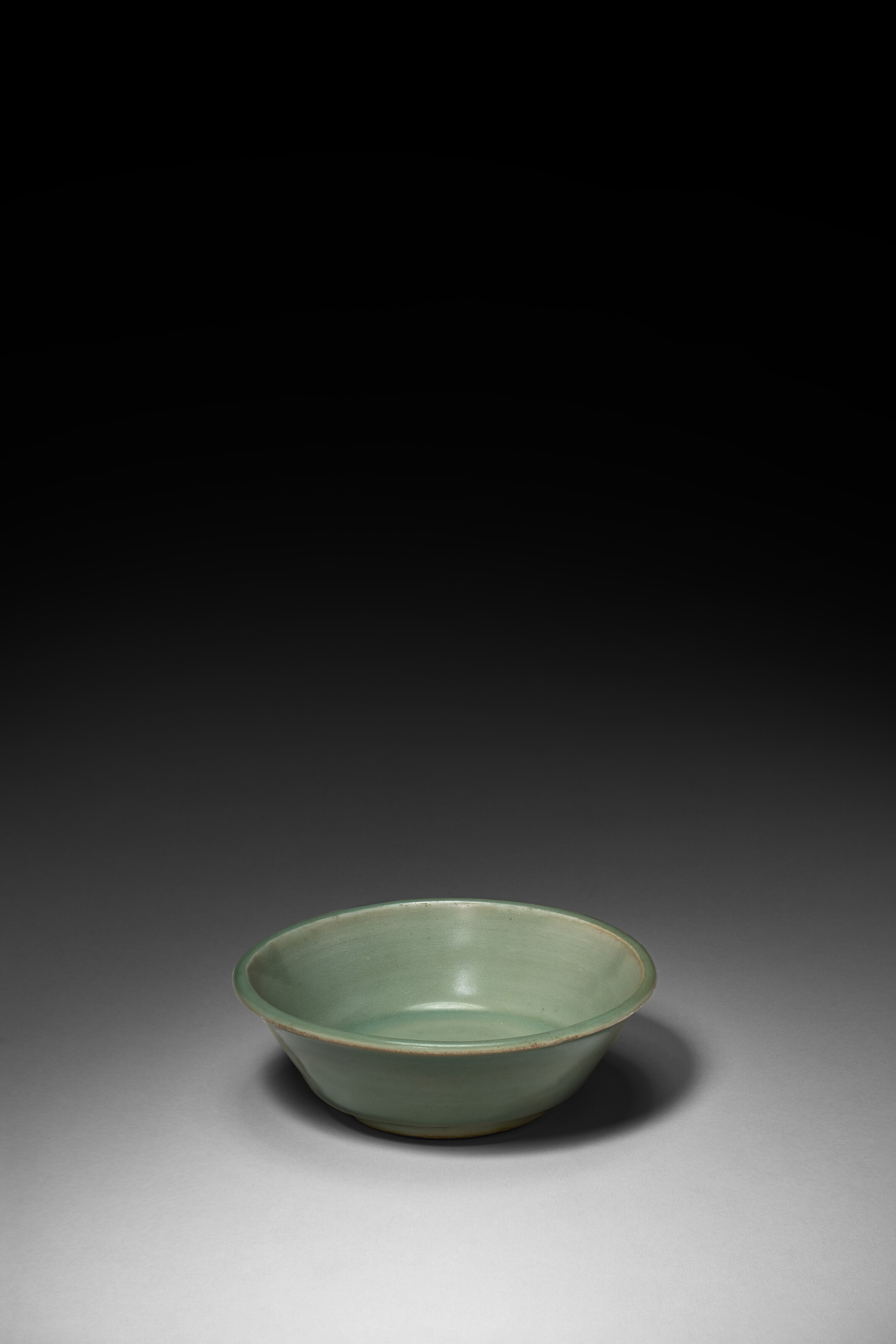AN INCISED QINGBAI 'FISH AND WAVES' BOWL, SOUTHERN SONG DYNASTY, 12TH ...